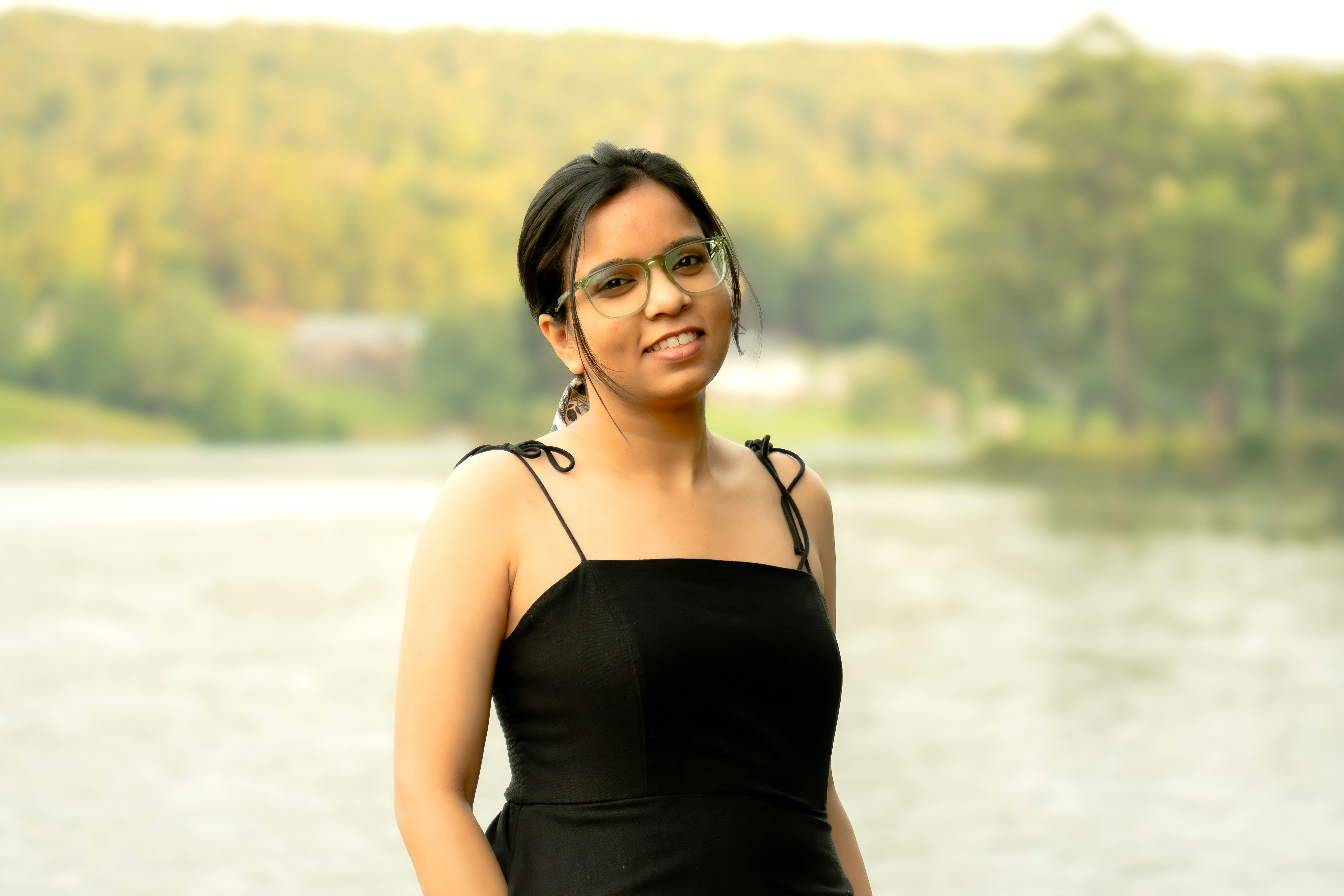 Black Dress, Golden Backdrop: Portrait by a Quiet Lakeside