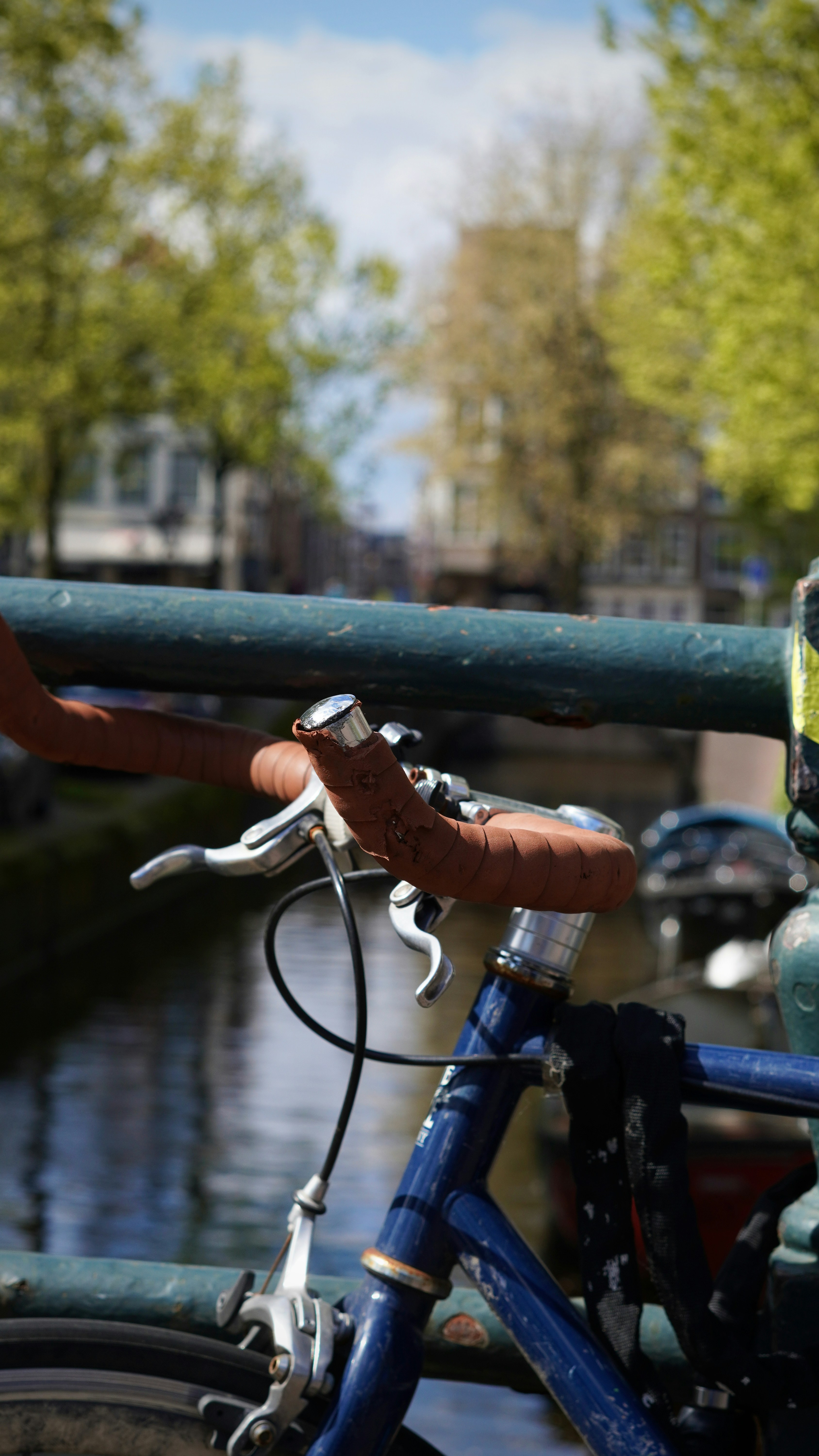 Weathered Bar Tape at the Rails: A City Canal Portrait