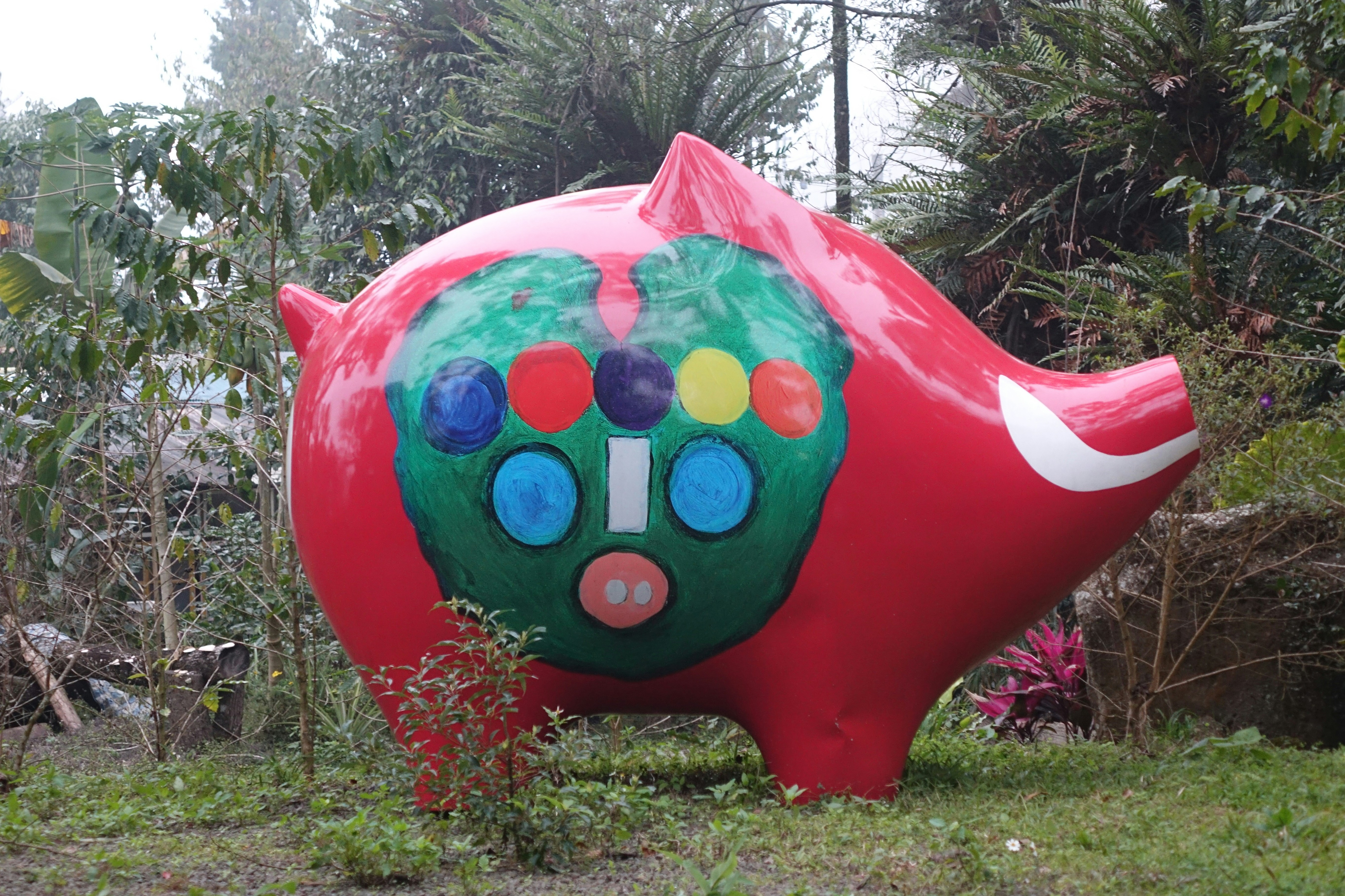 A large inflatable animal in the middle of a field