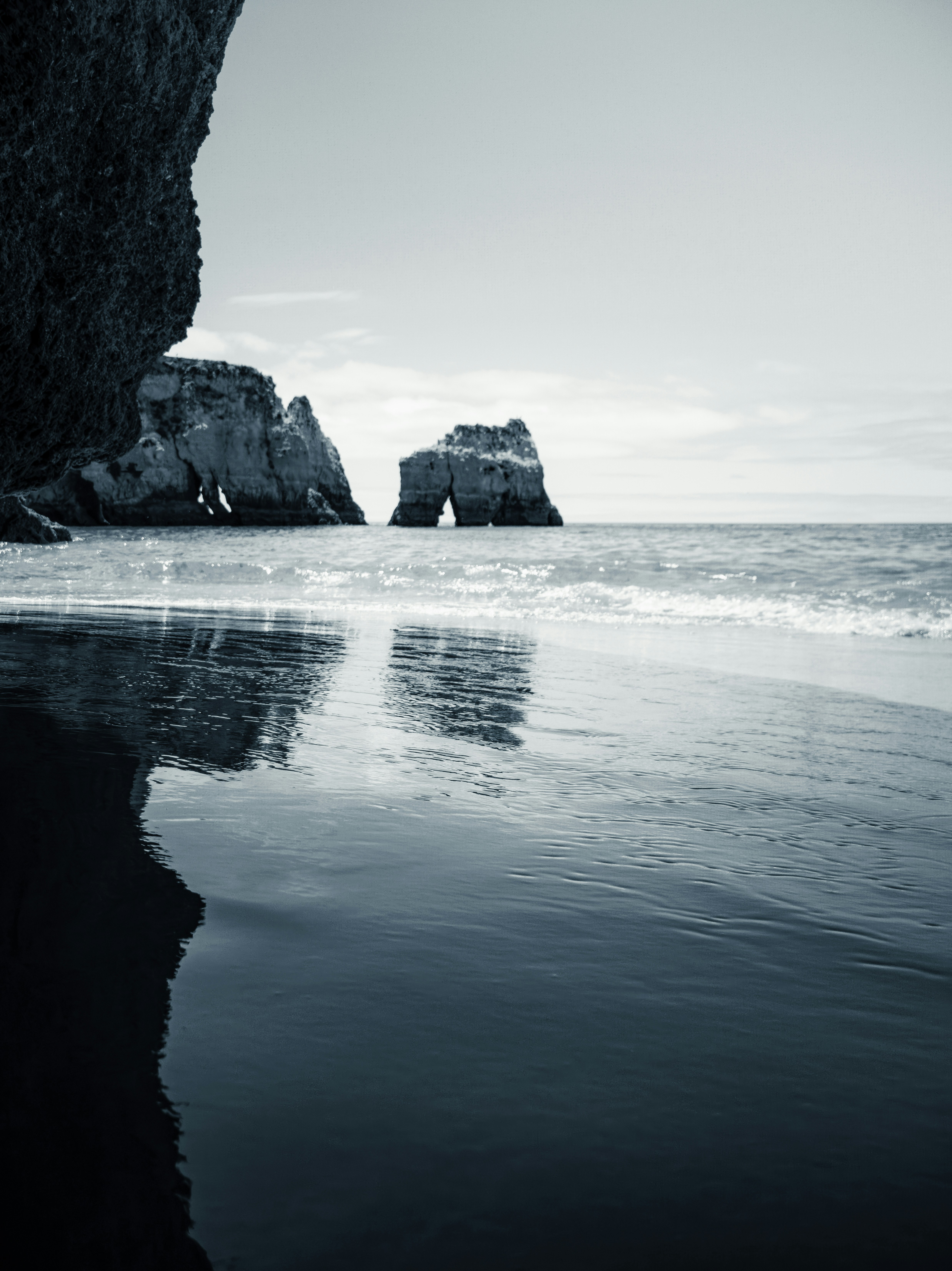 A black and white photo of some rocks in the water photo – Free Rock ...