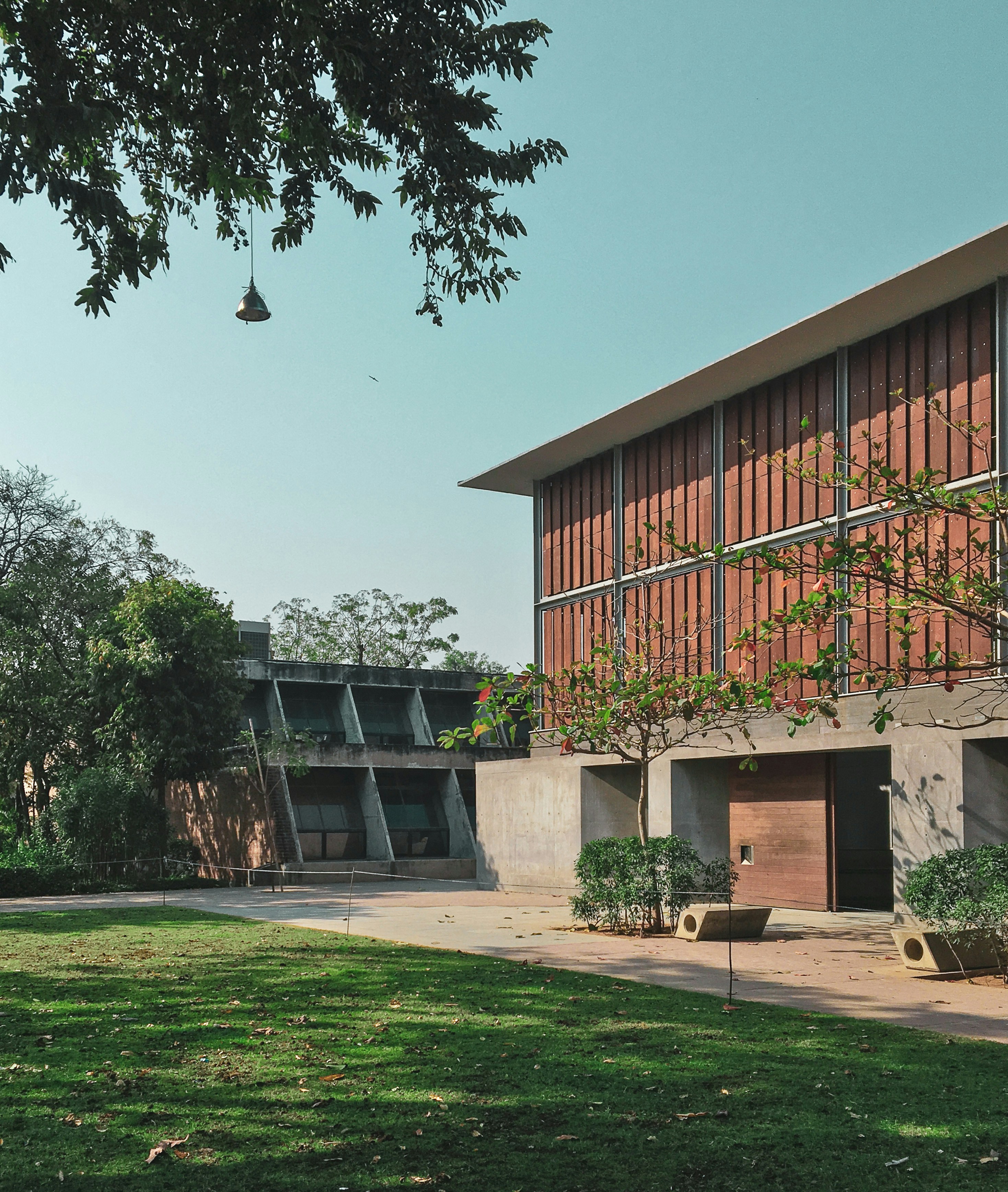 Midcentury Campus Wing Beneath a Clear Sky