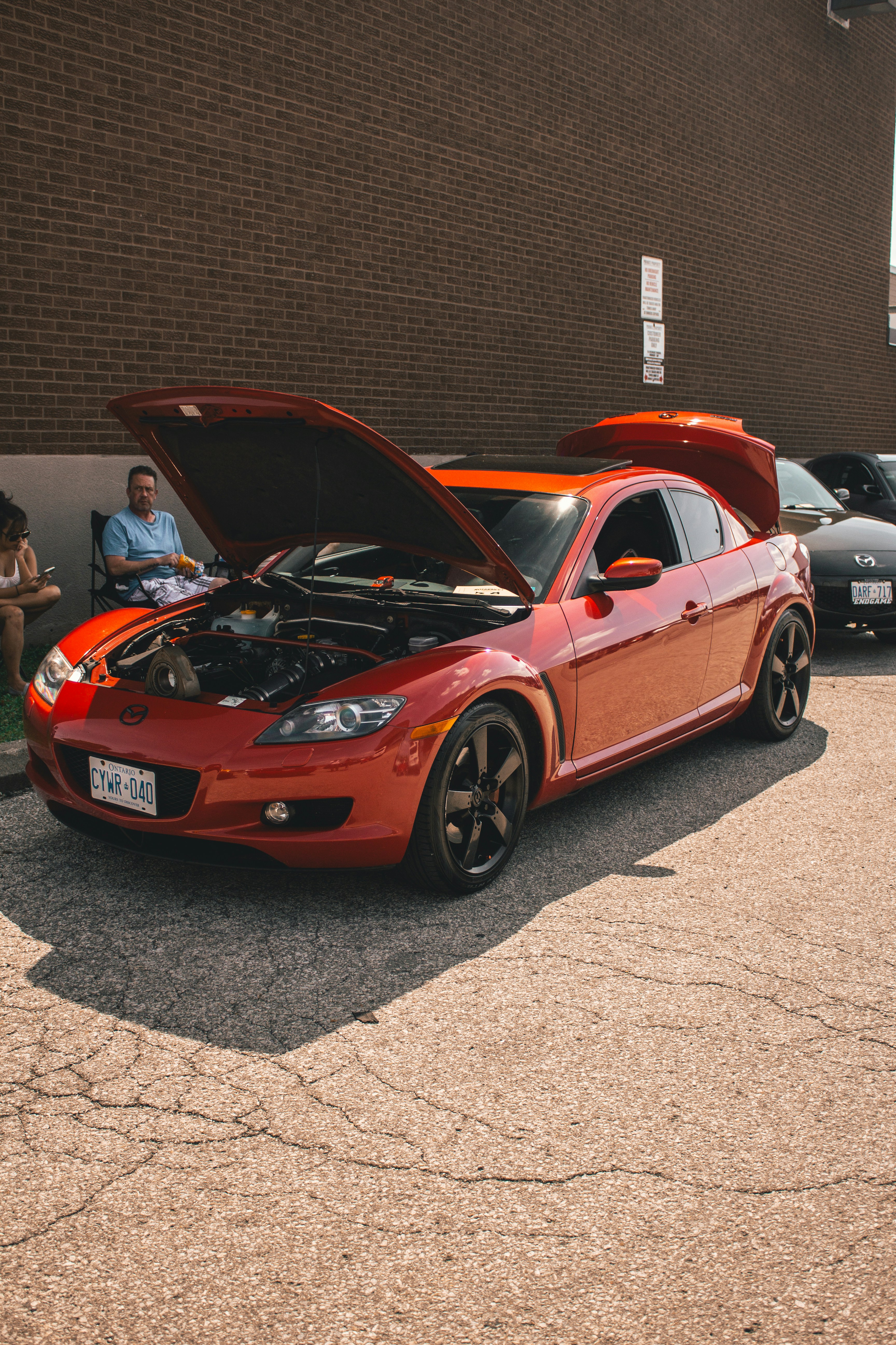 A red sports car with its hood open photo – Free Rx8 Image on Unsplash