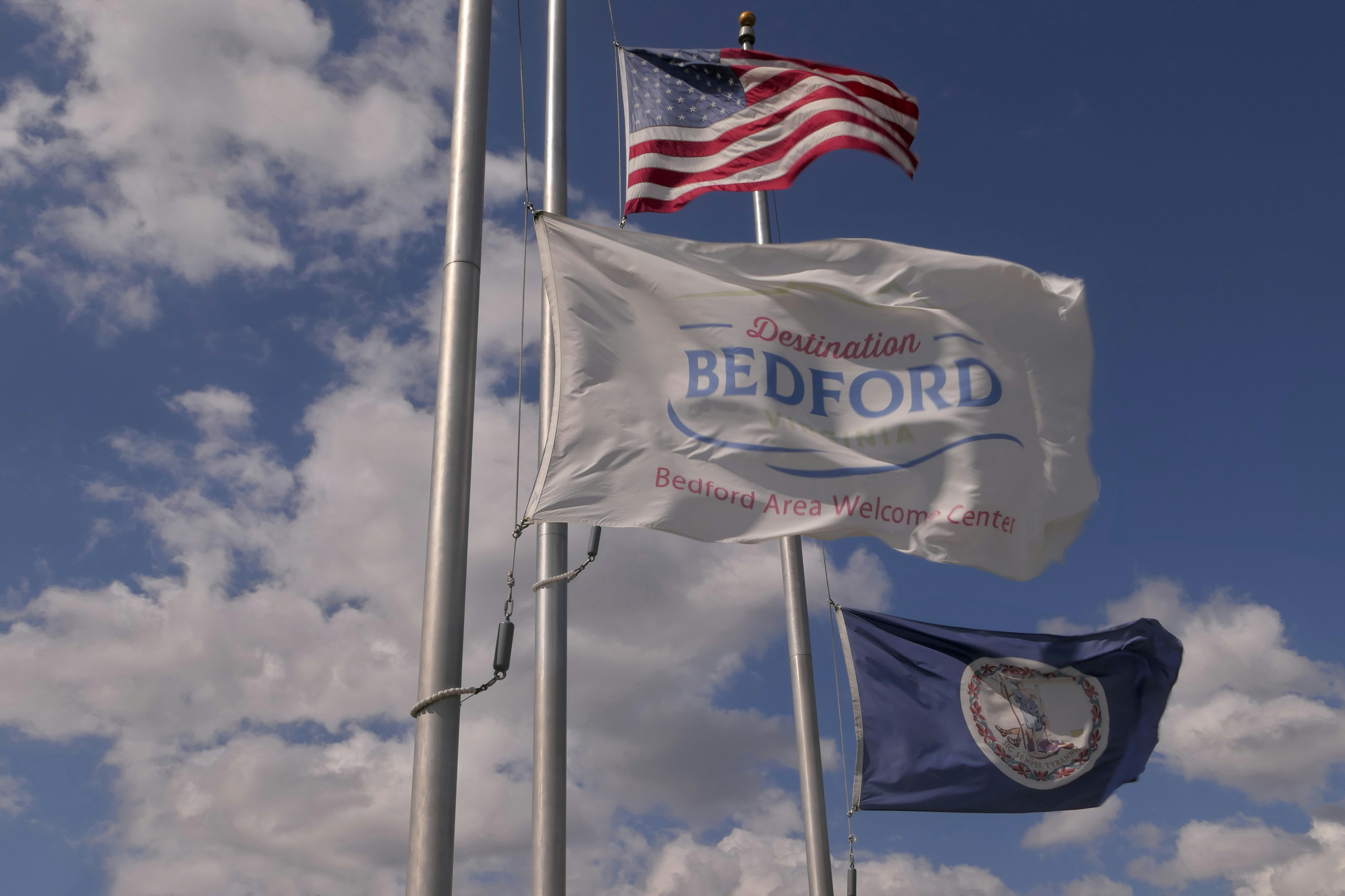 A group of flags flying in the wind photo – Free Clouds Image on Unsplash