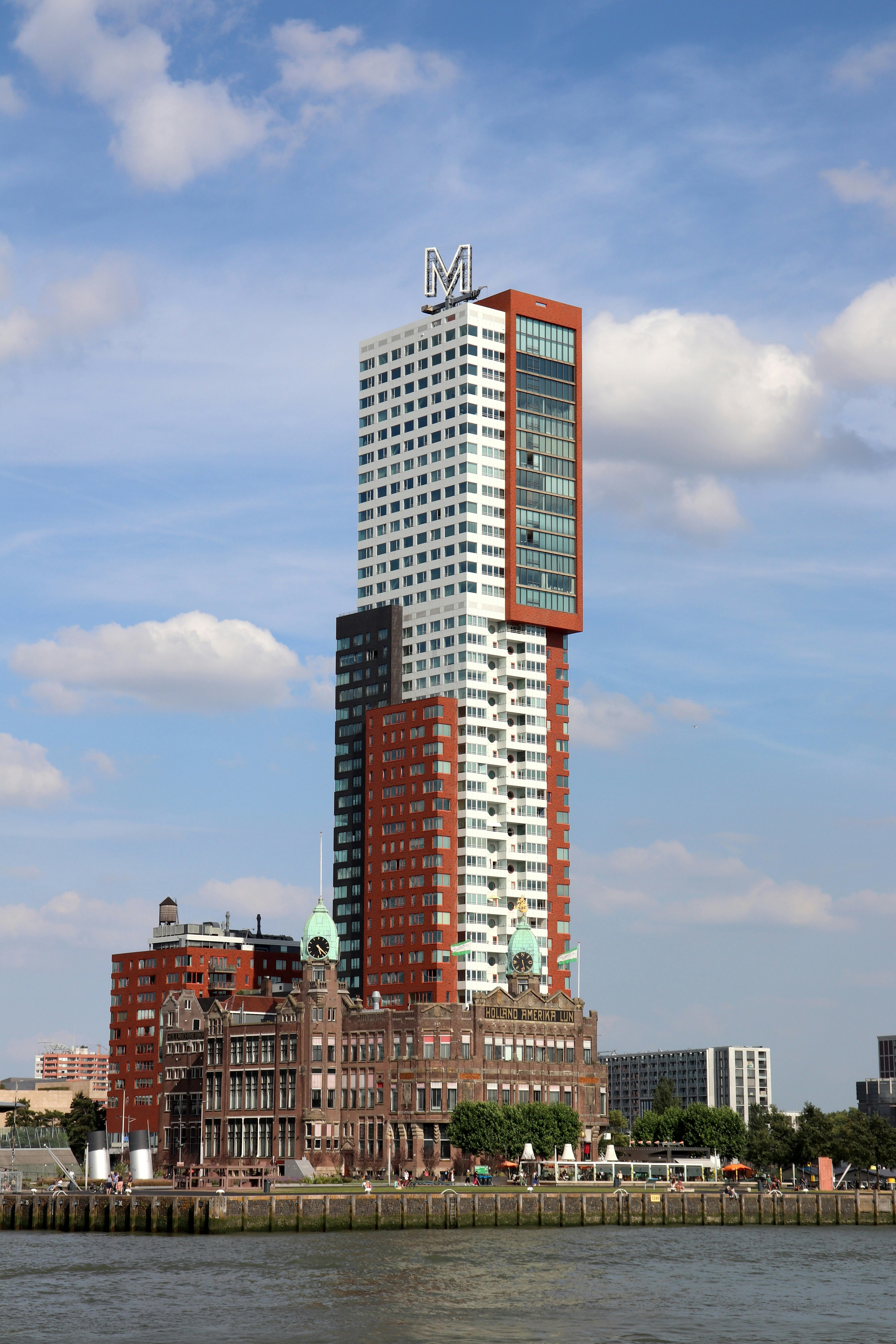 Mighty Harbor Tower: A Red Brick Skyline Pierces the Sky