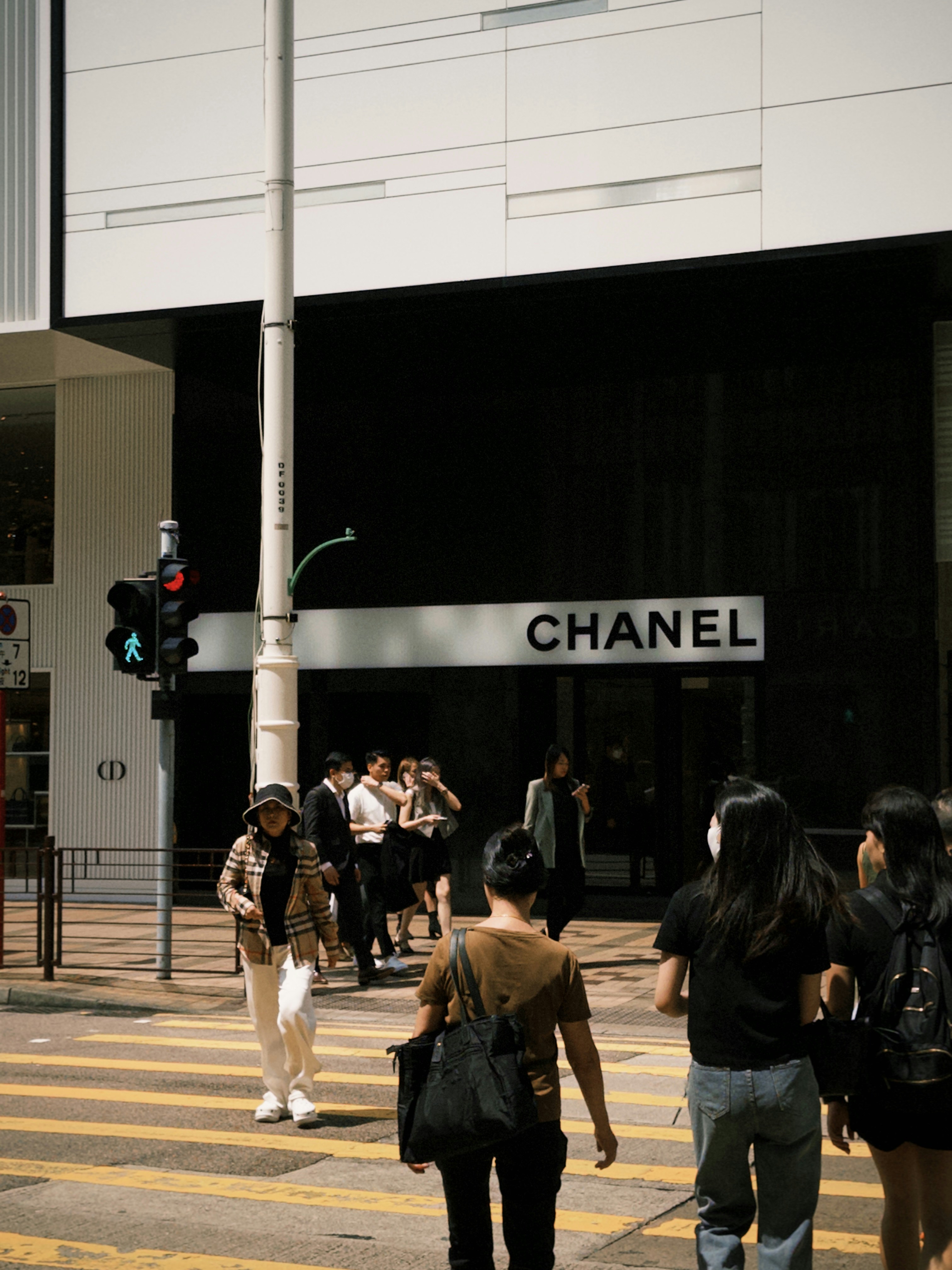 Crosswalk Couture: Pedestrians and the Chanel Facade