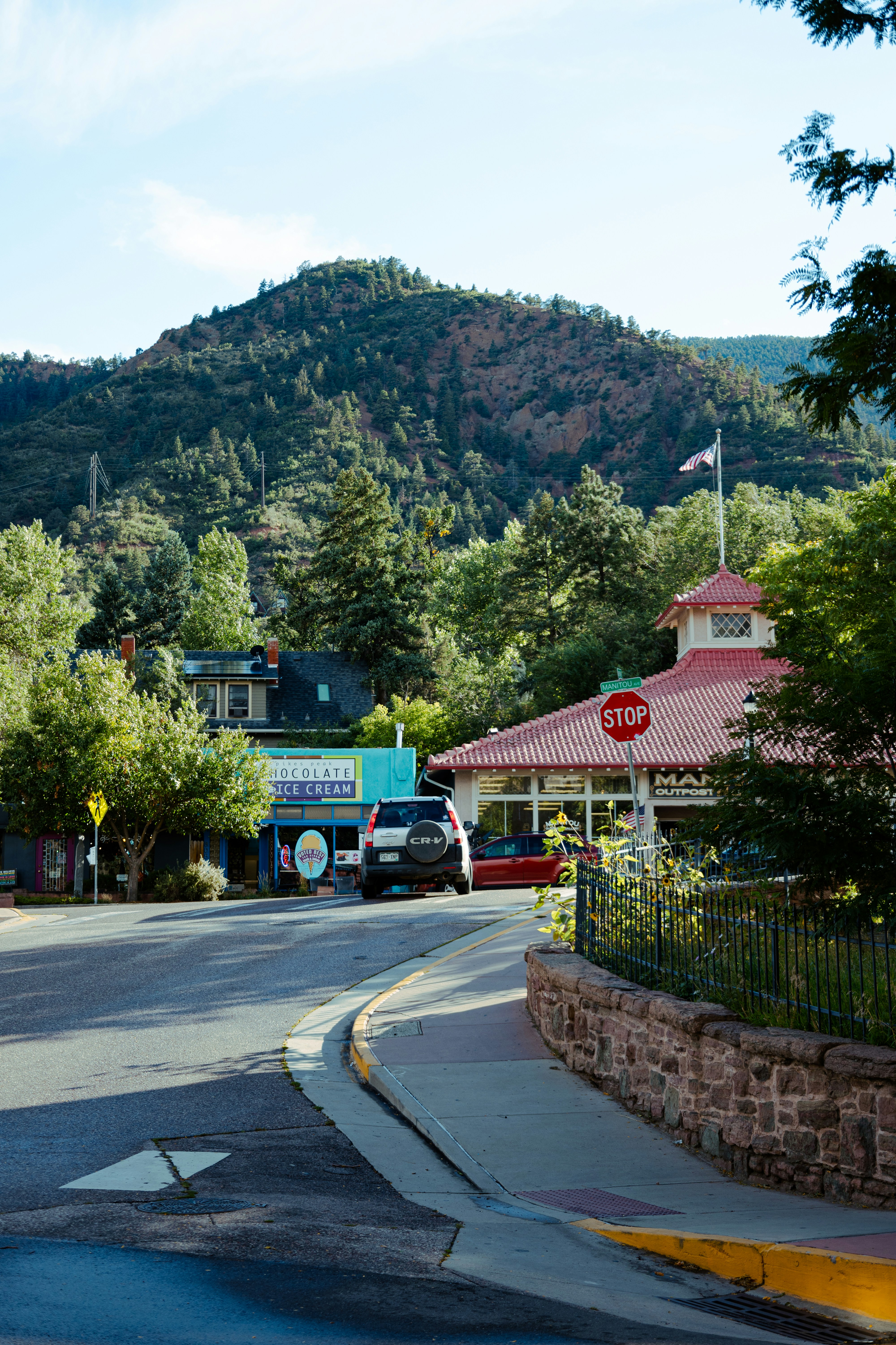 Stop Sign at Crescent Curve in a Mountain Town