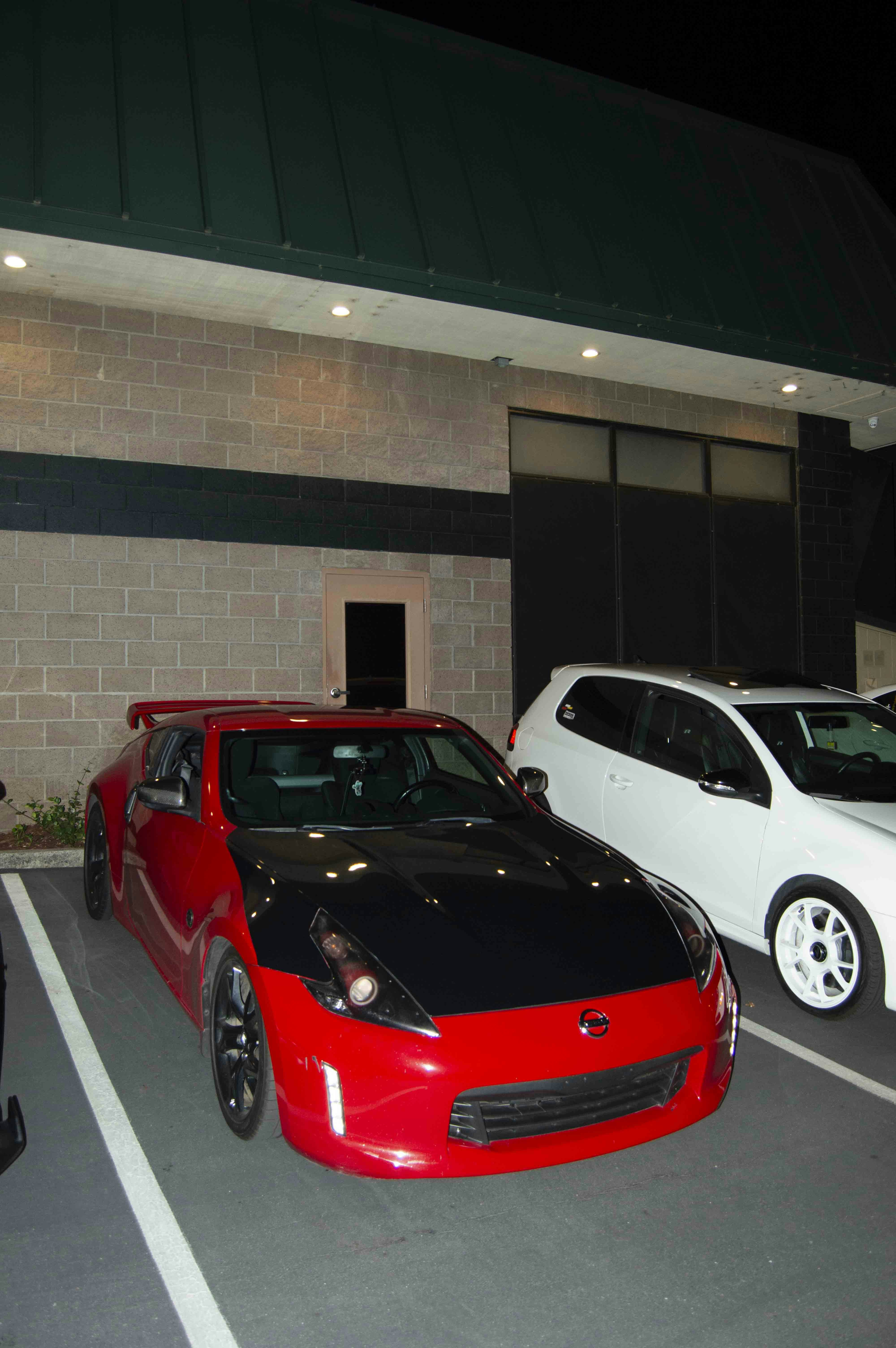 Crimson Velocity in a Night Garage