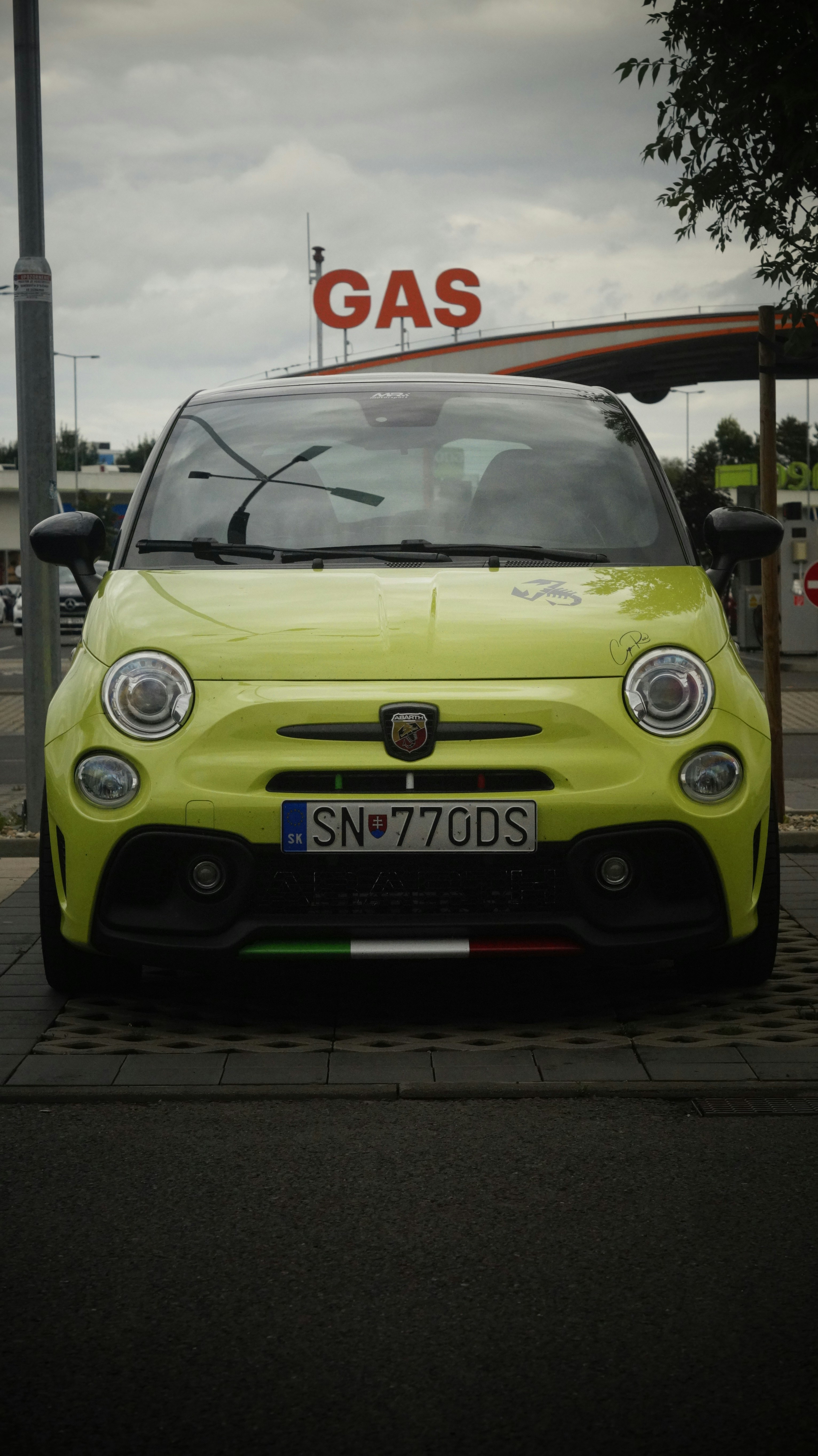 Lime-Abarth Front View at a Gas Station