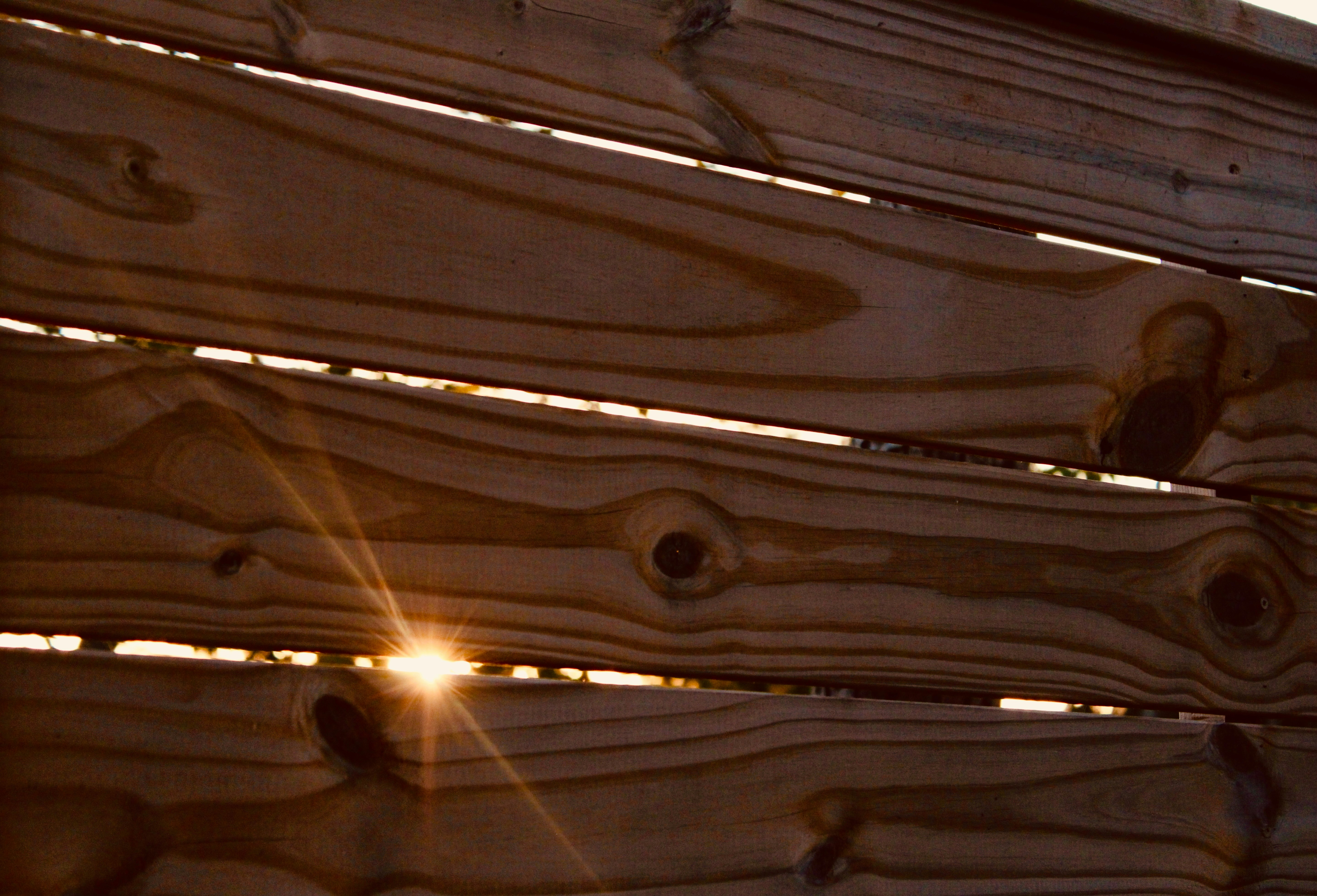 Sunburst Between Weathered Slats
