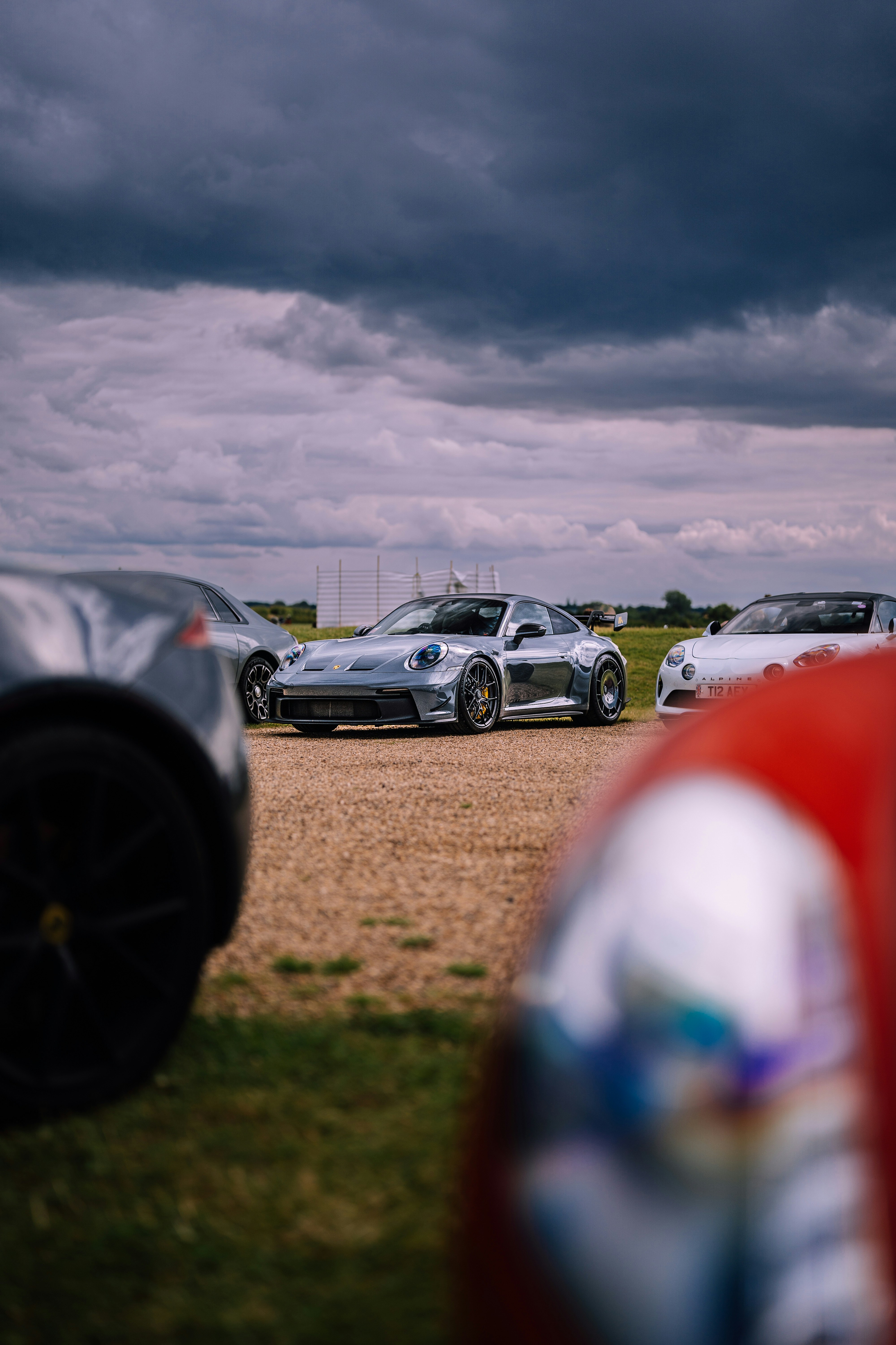 Porsche Lineup at Dusk: Center Stage on the Silver Bullet