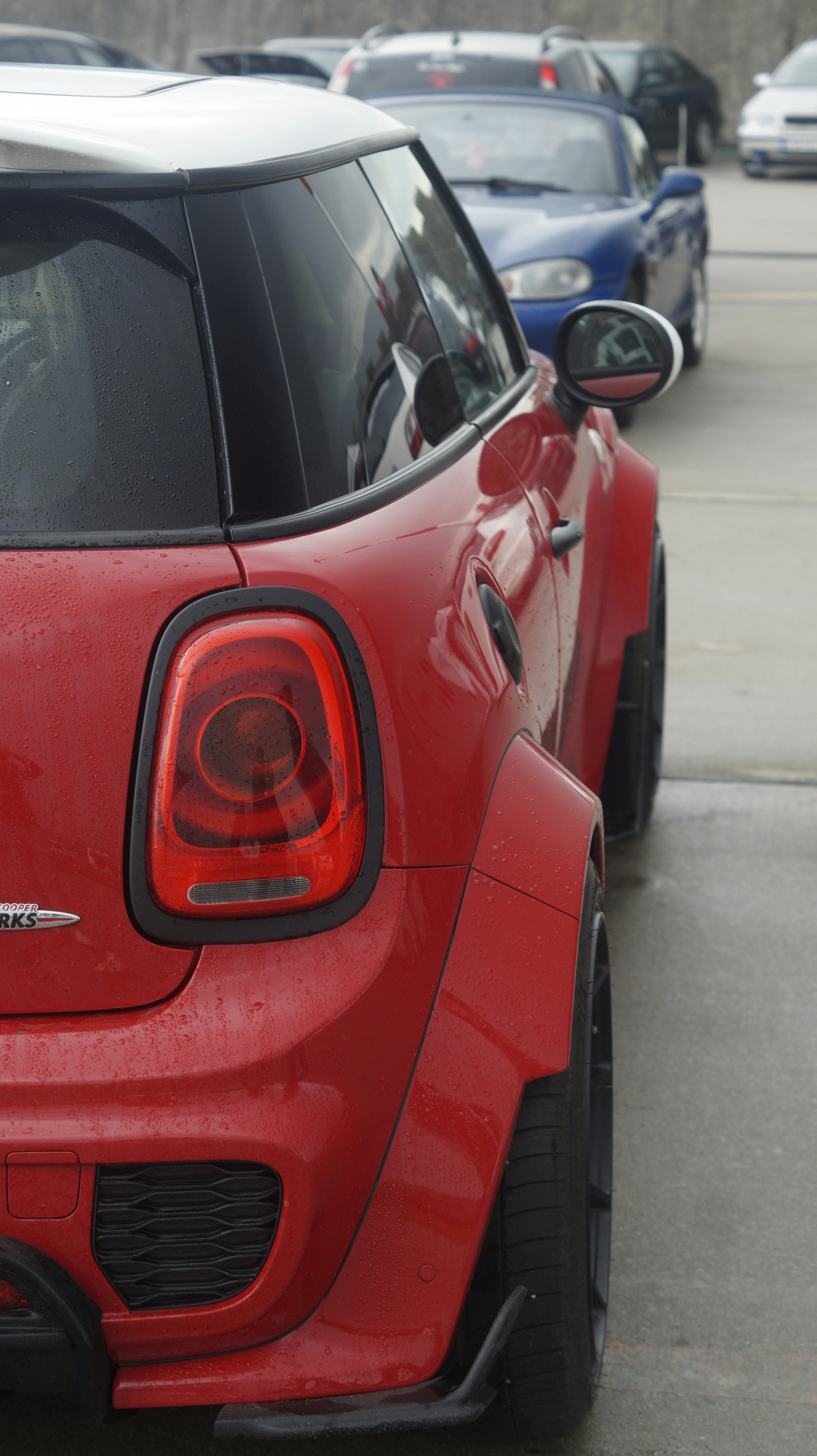 A small red car parked in a parking lot photo – Free Trenčín Image on ...