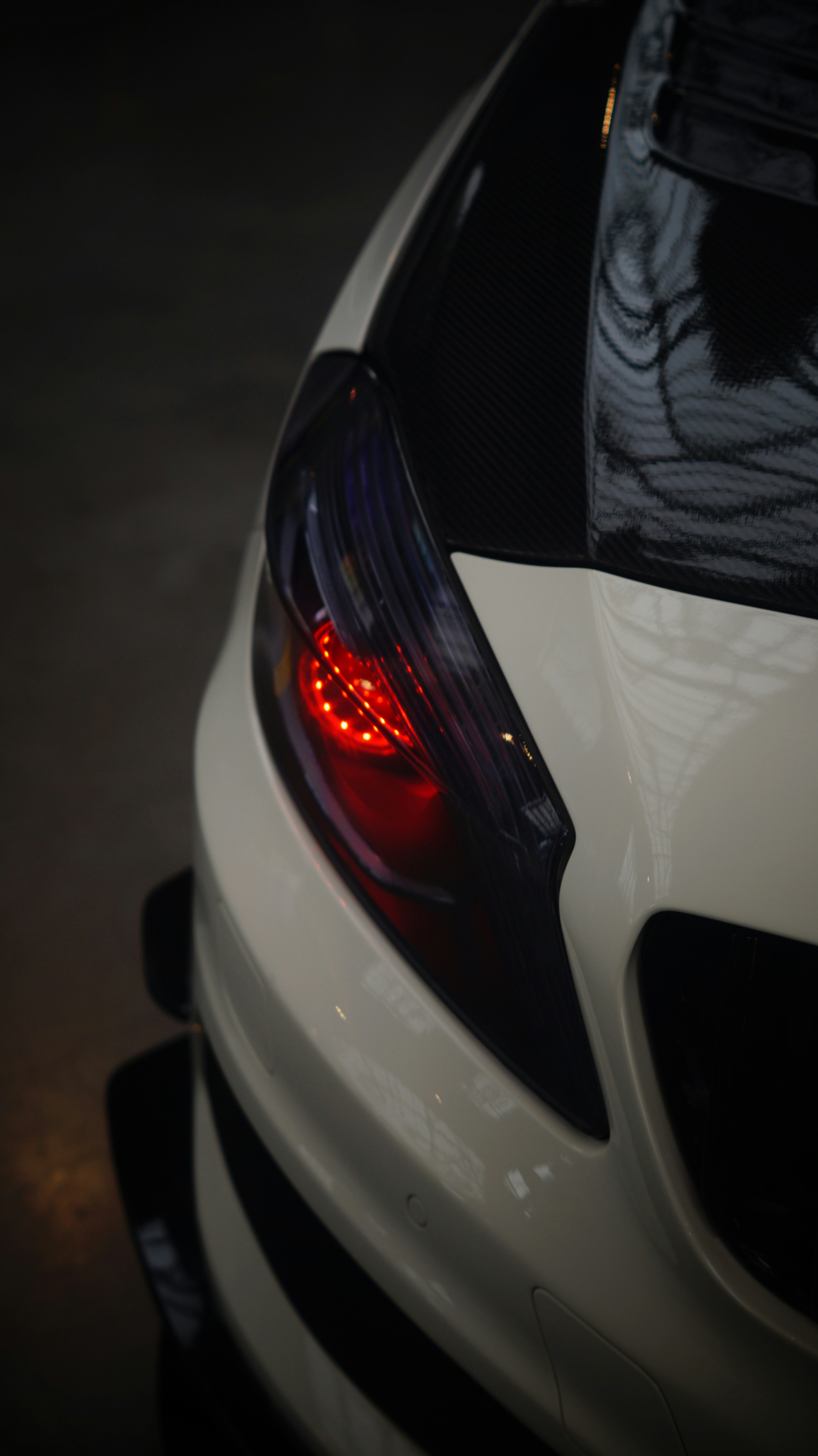 A close up of the tail lights of a white car photo – Free Amg Image on ...