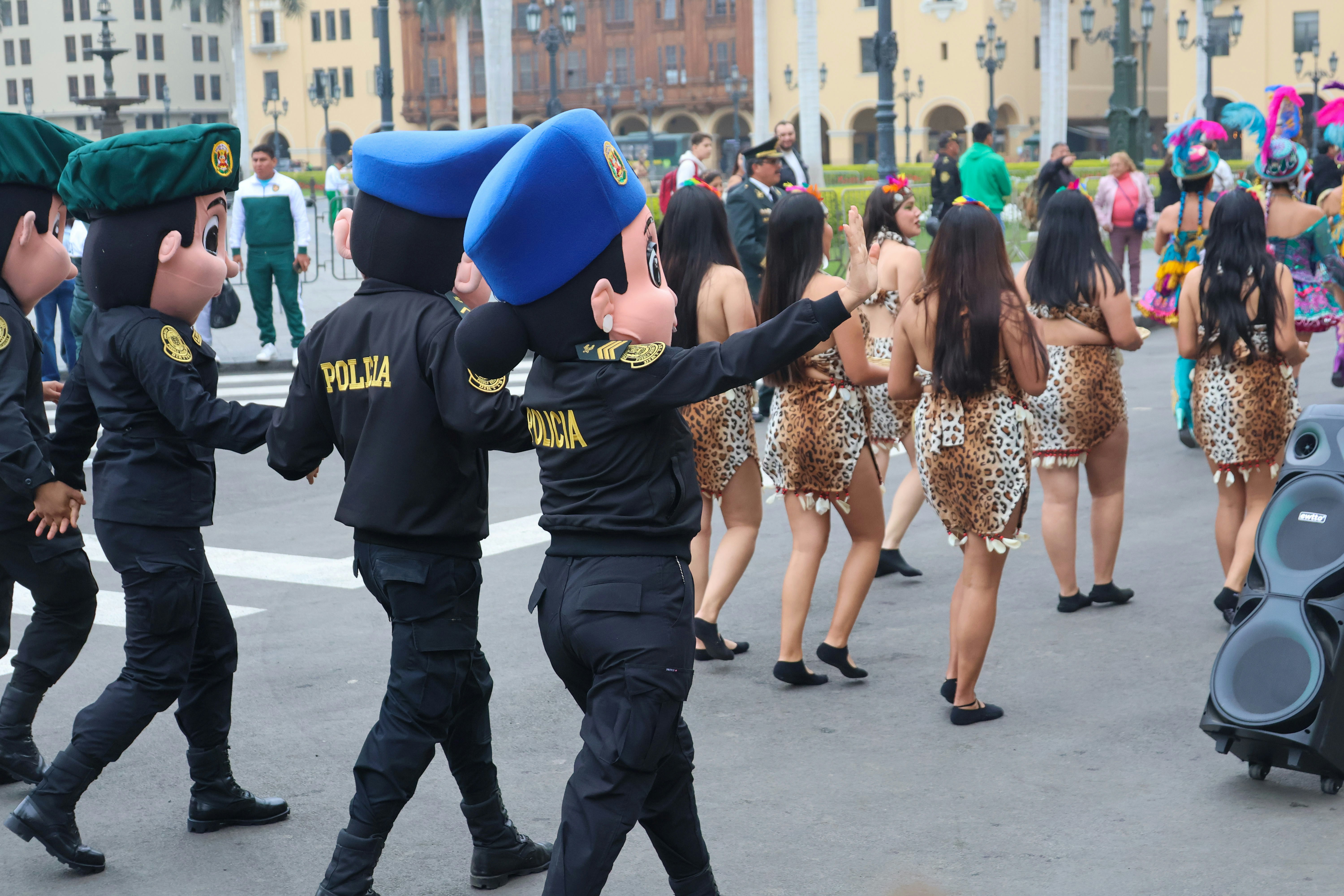 Polica | A group of people that are standing in the street