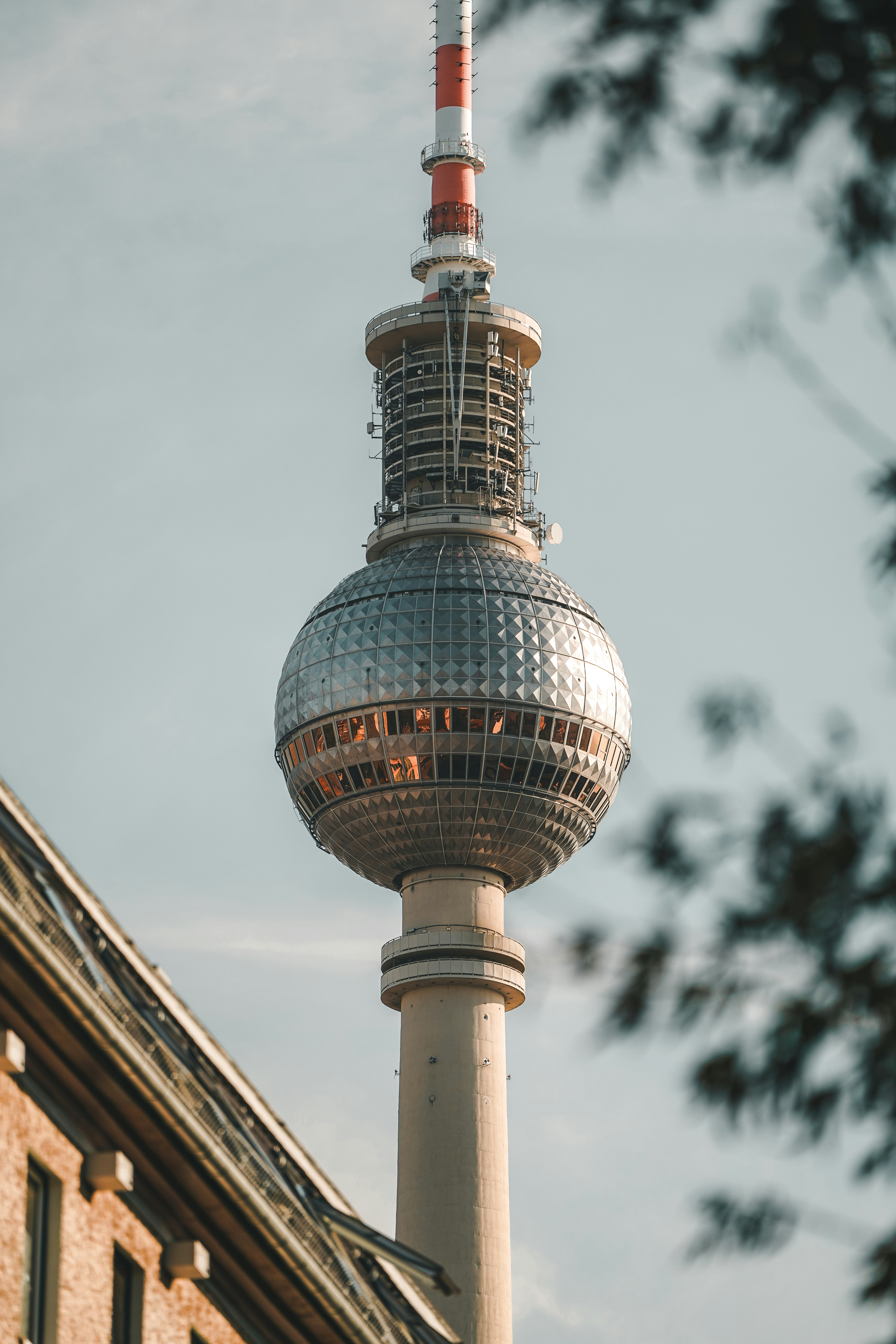 A very tall building with a very tall tower photo – Free Berlin Image ...