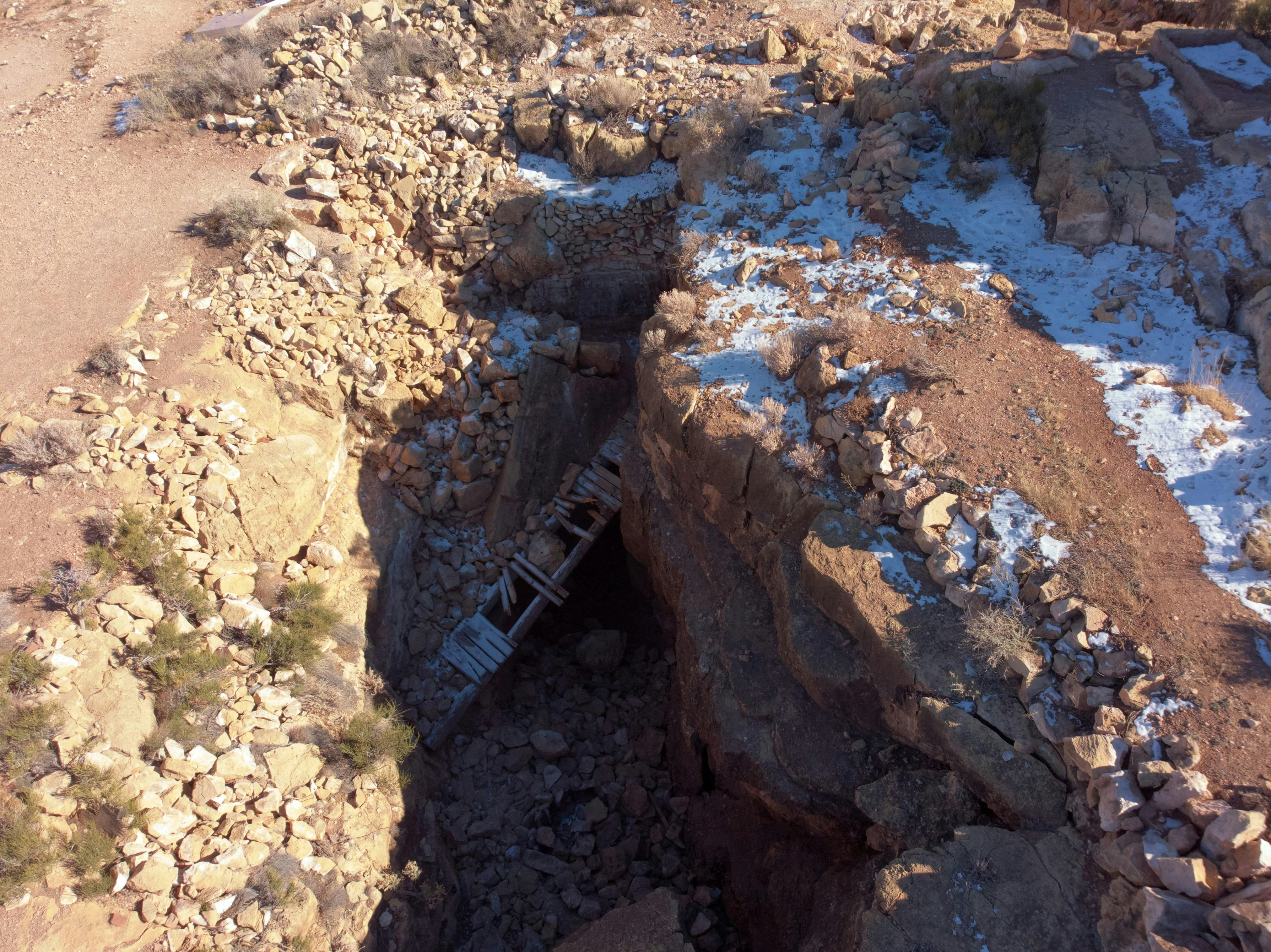 A view of a rocky outcropping with snow on the ground photo – Free ...