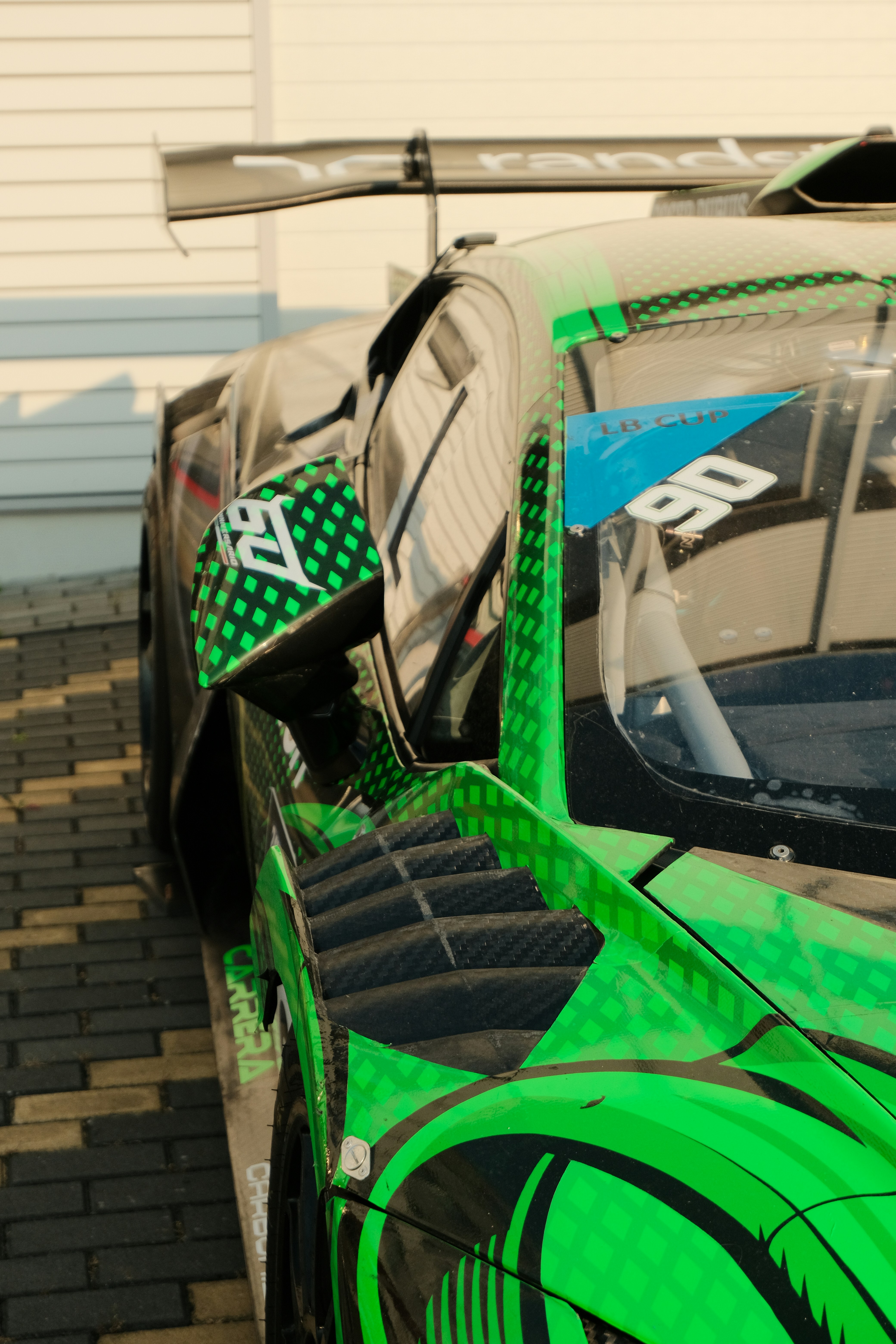 Lime Circuit: Neon-Geometric Racing Car Under Spotlight