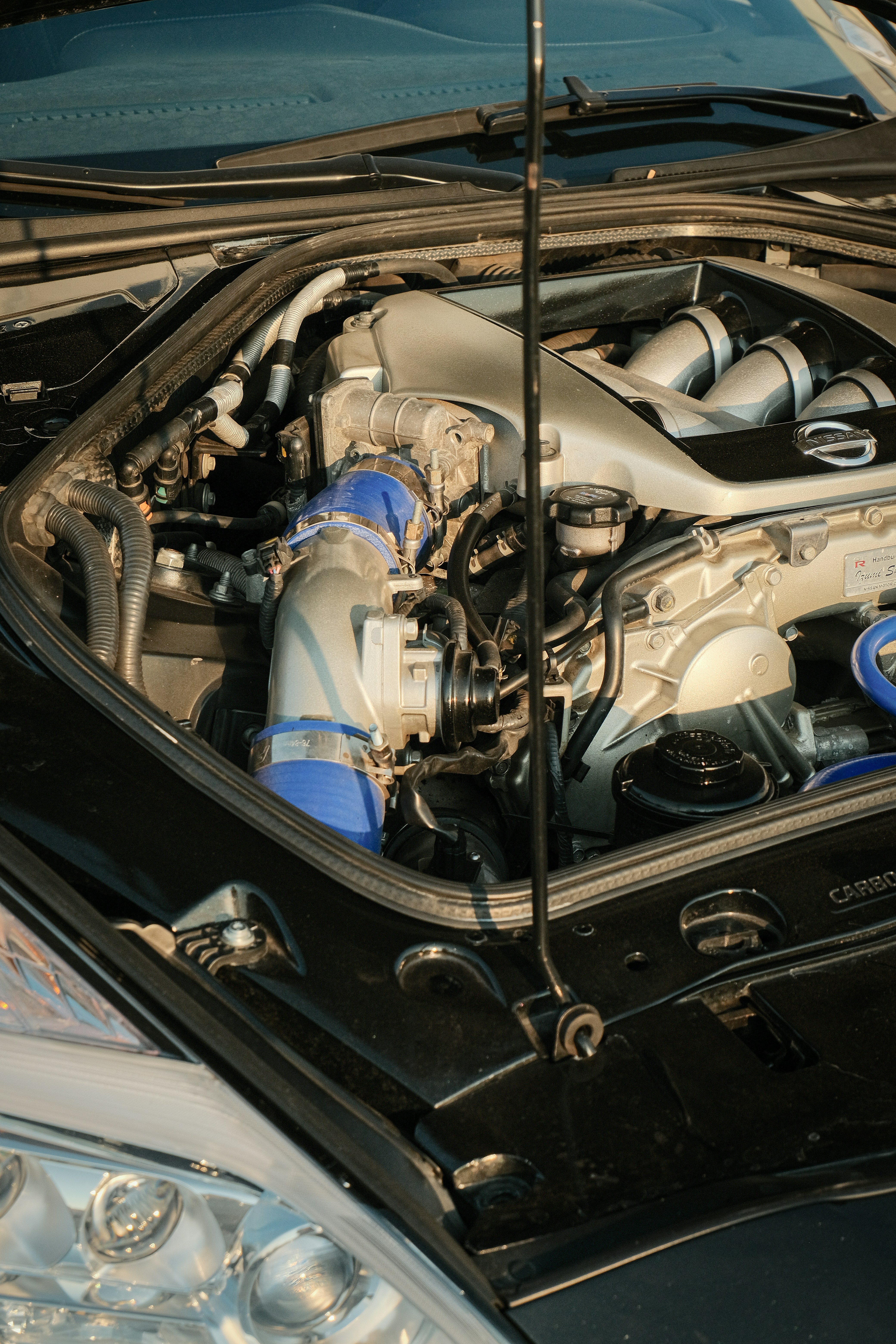 The engine of a car is shown in this image photo – Free Car culture ...