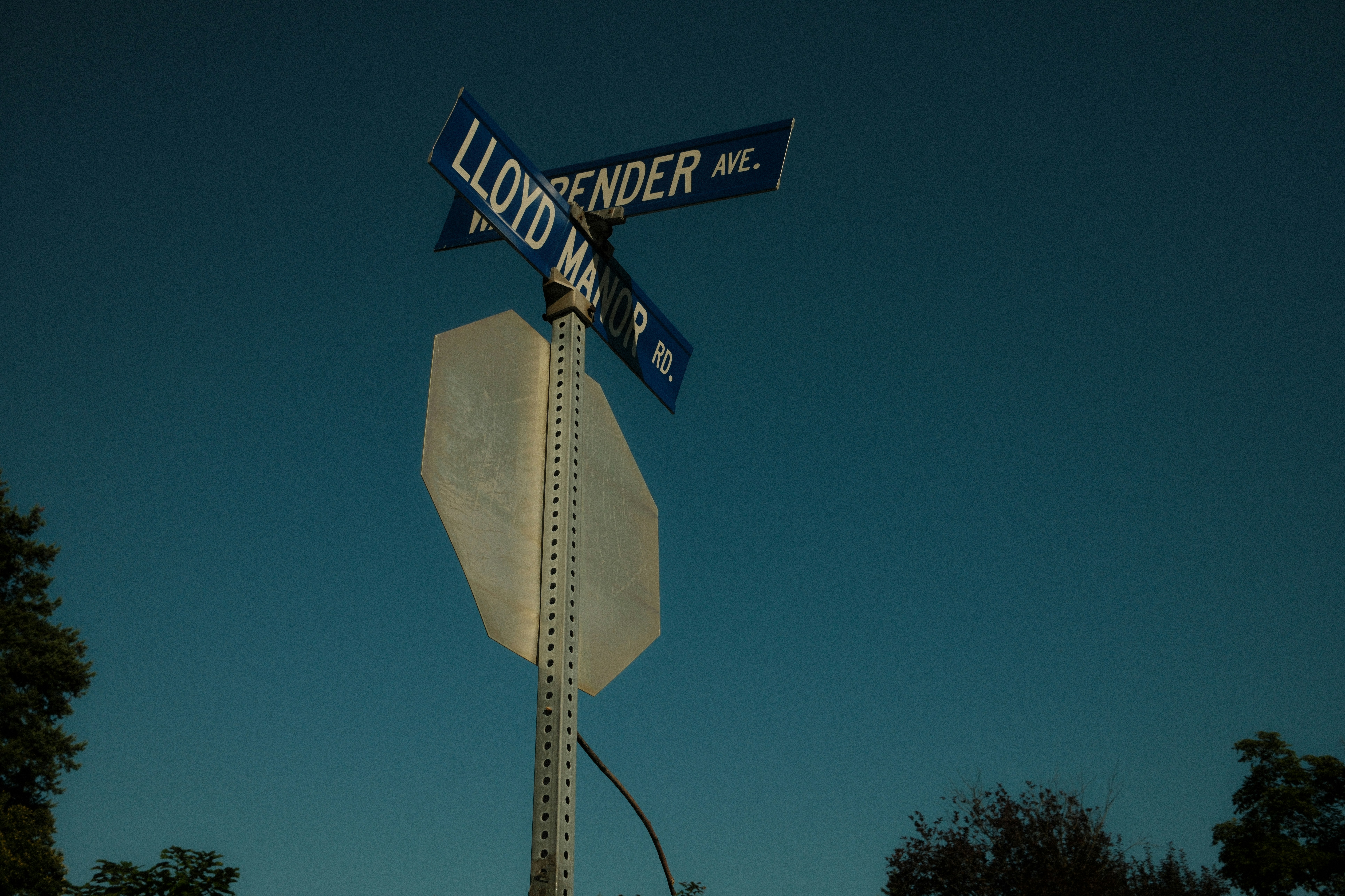 Two street signs on top of a stop sign photo – Free Toronto Image on ...