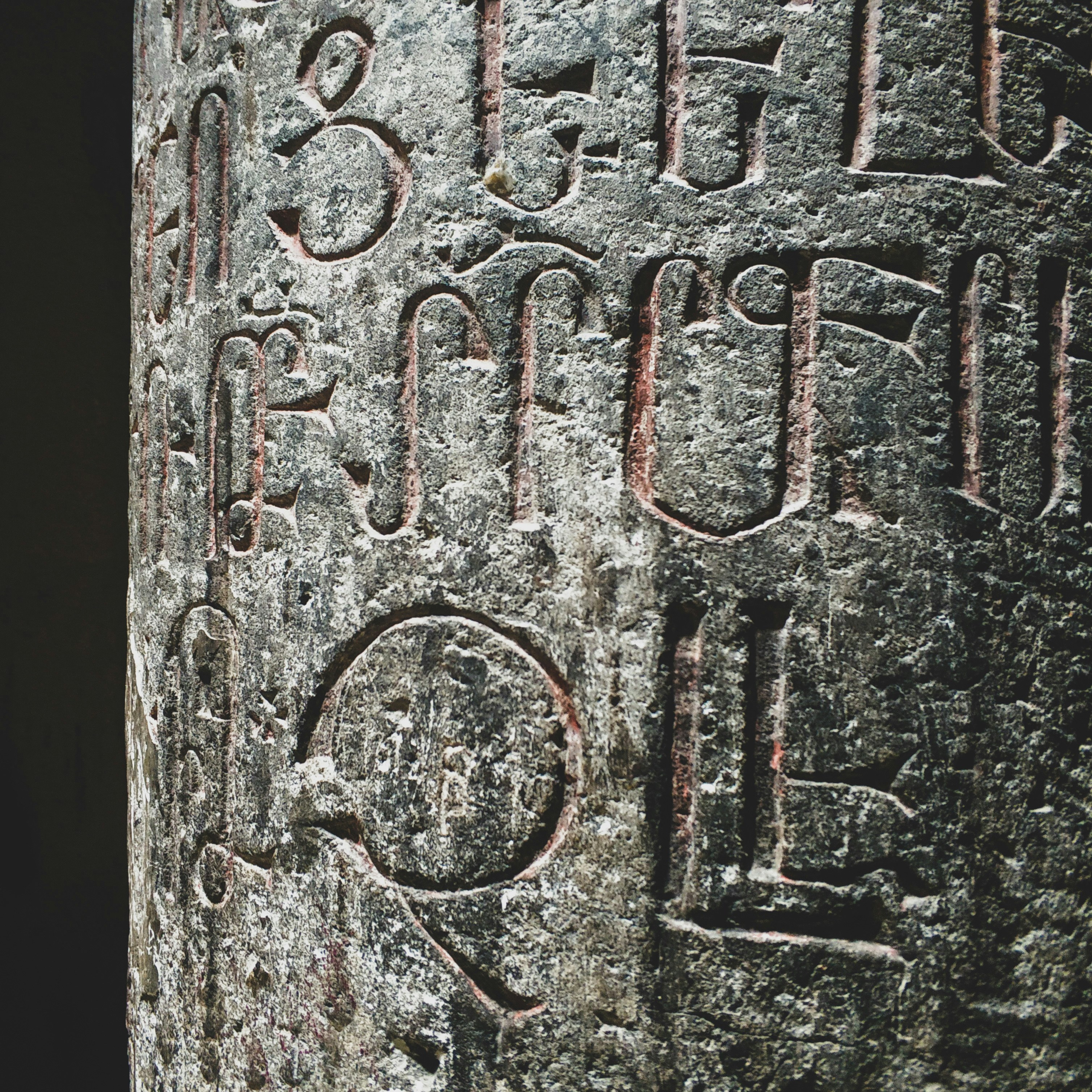 A close up of a stone pillar with writing on it photo – Free Geghard ...