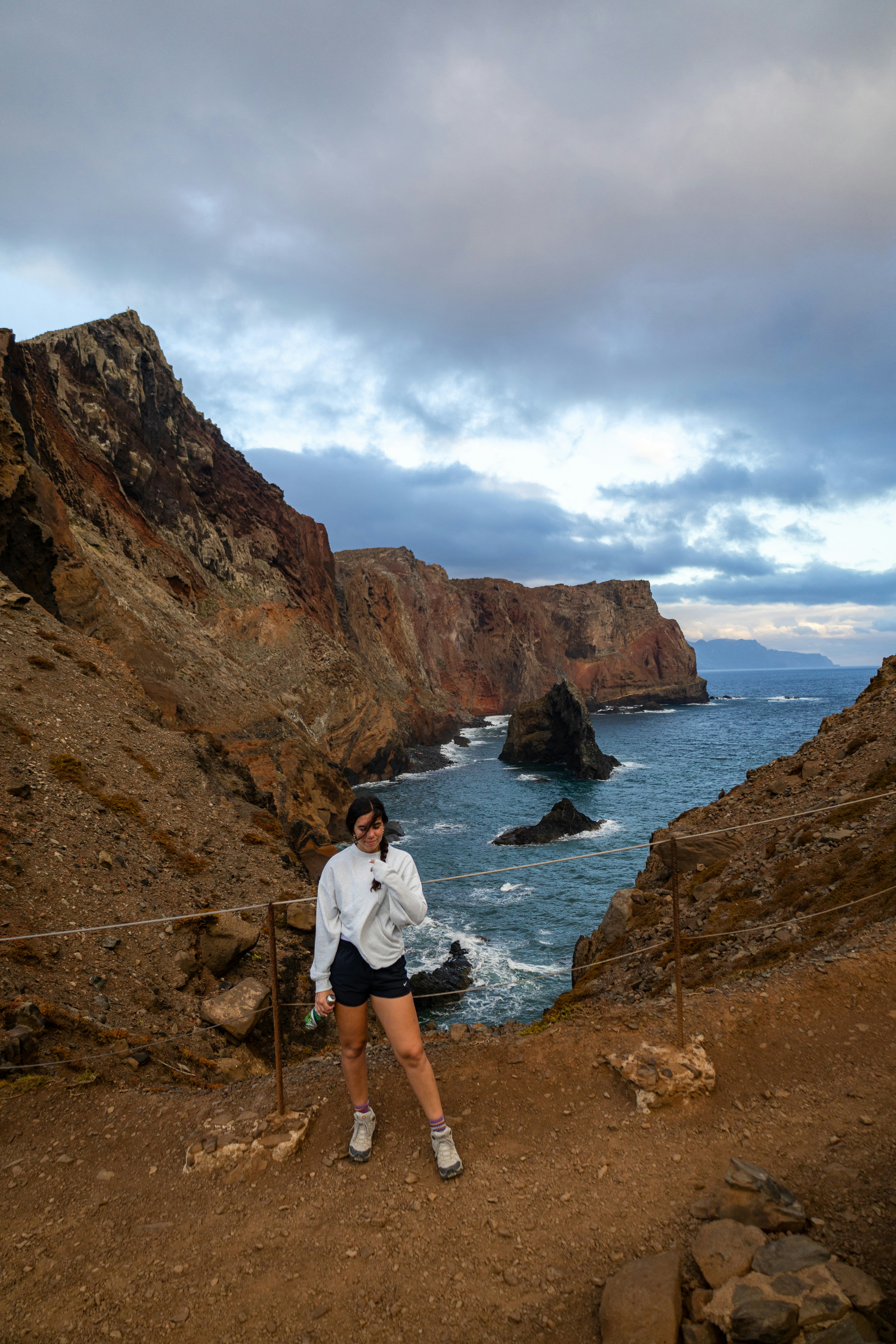 Cliffside Pathway: Solitary Traveler at Dawn