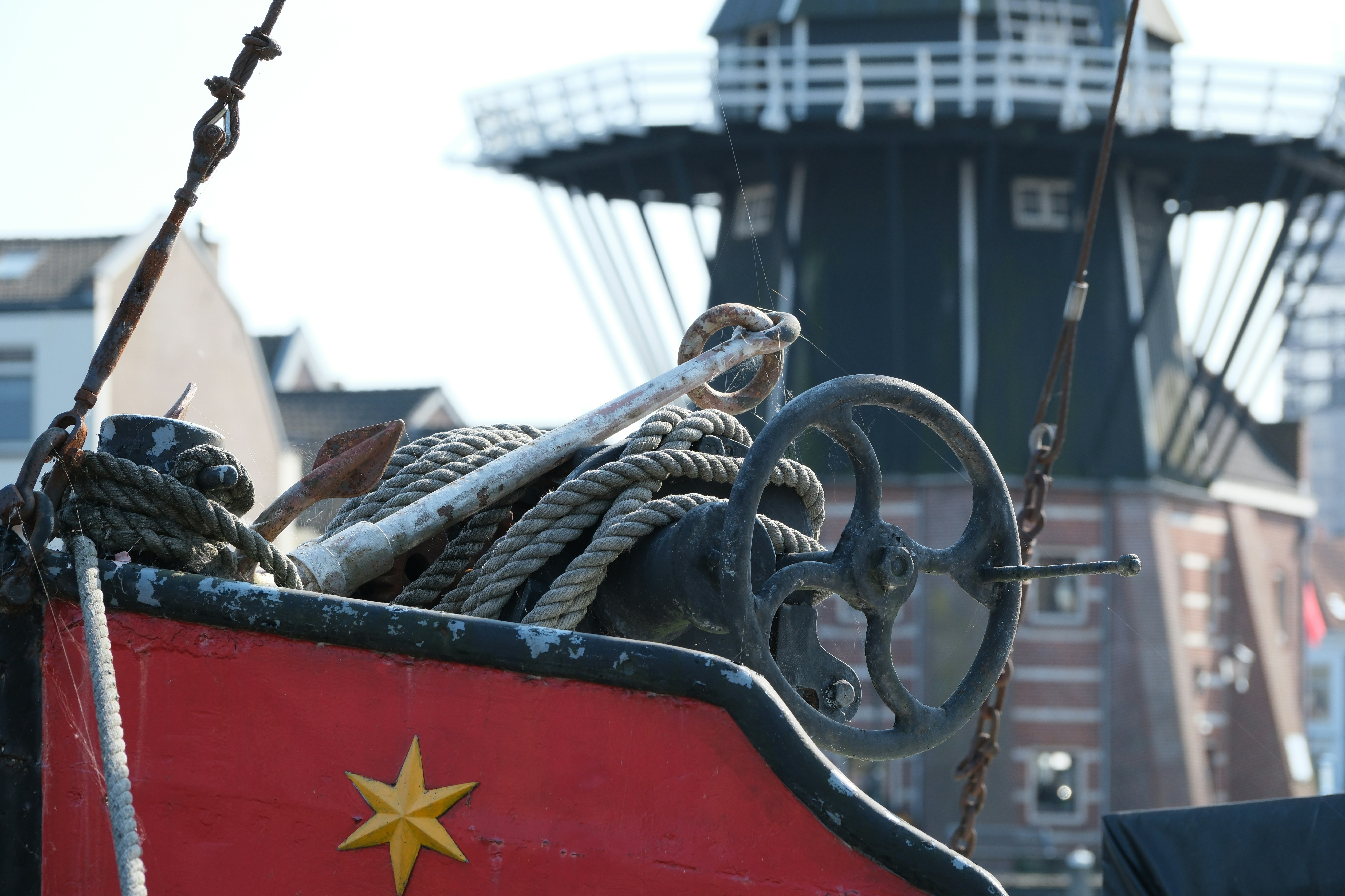 Rope, Wheel and Star: A Maritime Close-Up at the Dock