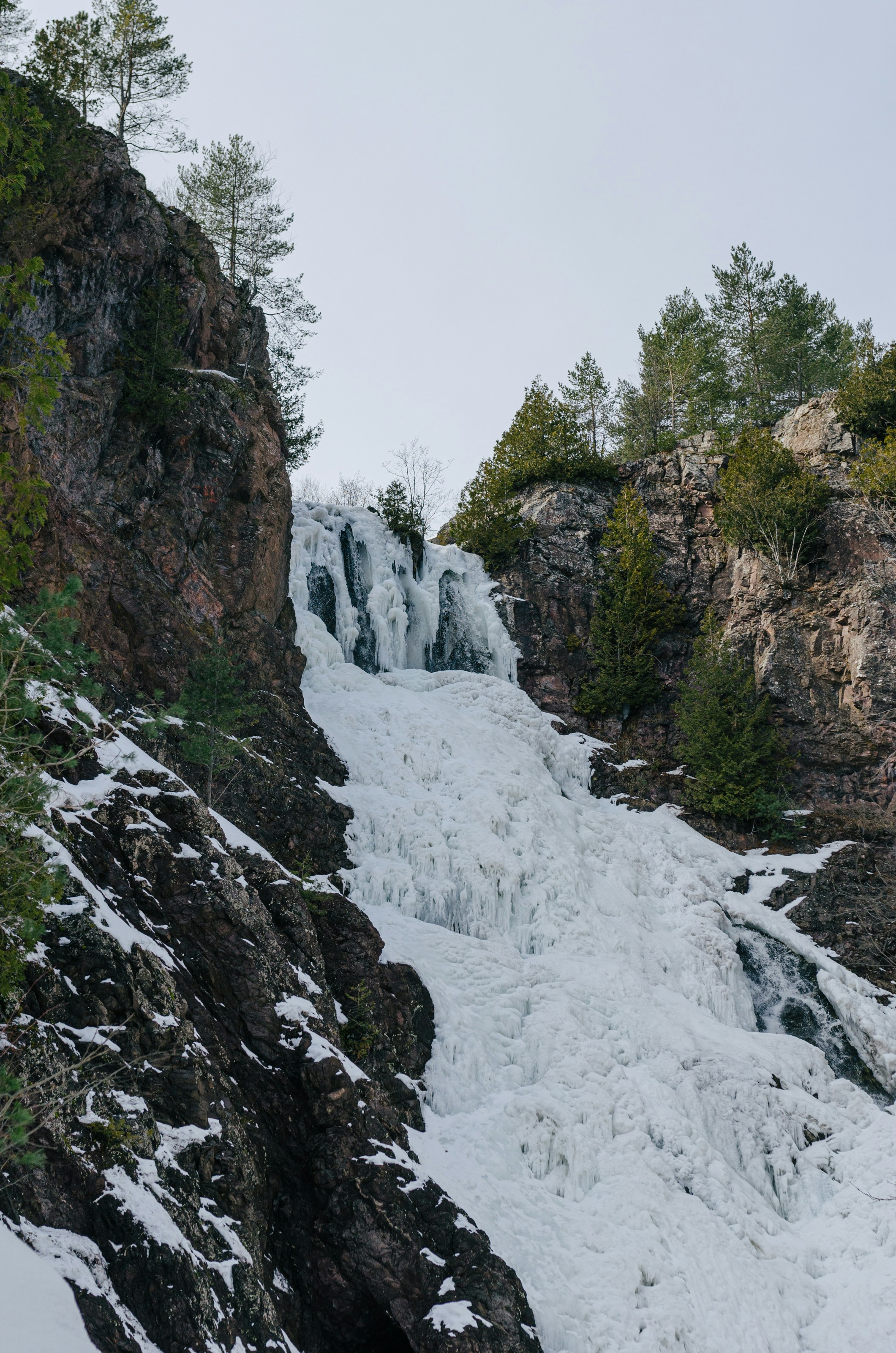 Icy Veil Cascades Through a Granite Gorge