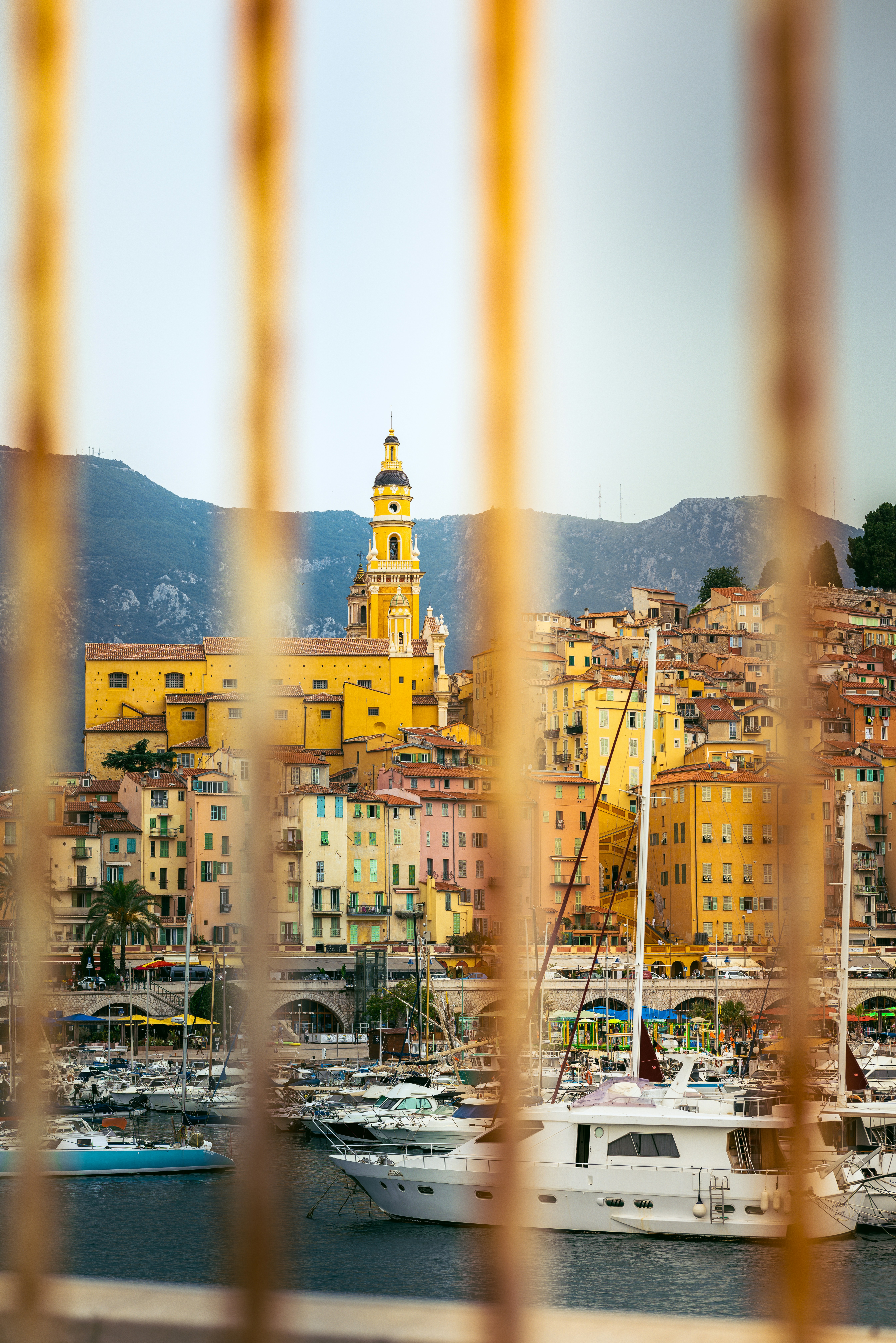A harbor filled with lots of boats next to a city photo – Free Menton ...