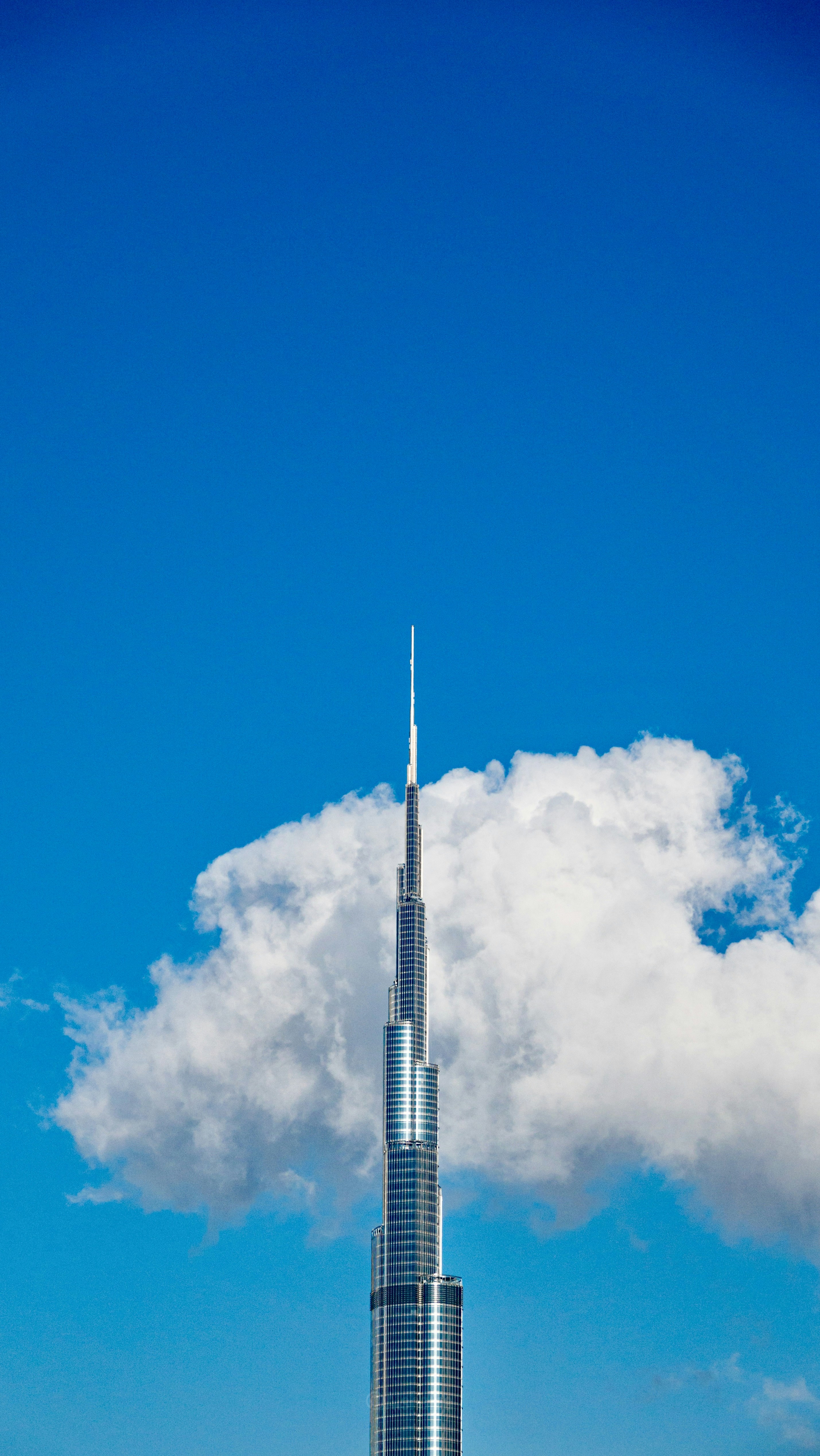 A very tall building with a very tall tower photo – Free Dubai - united ...