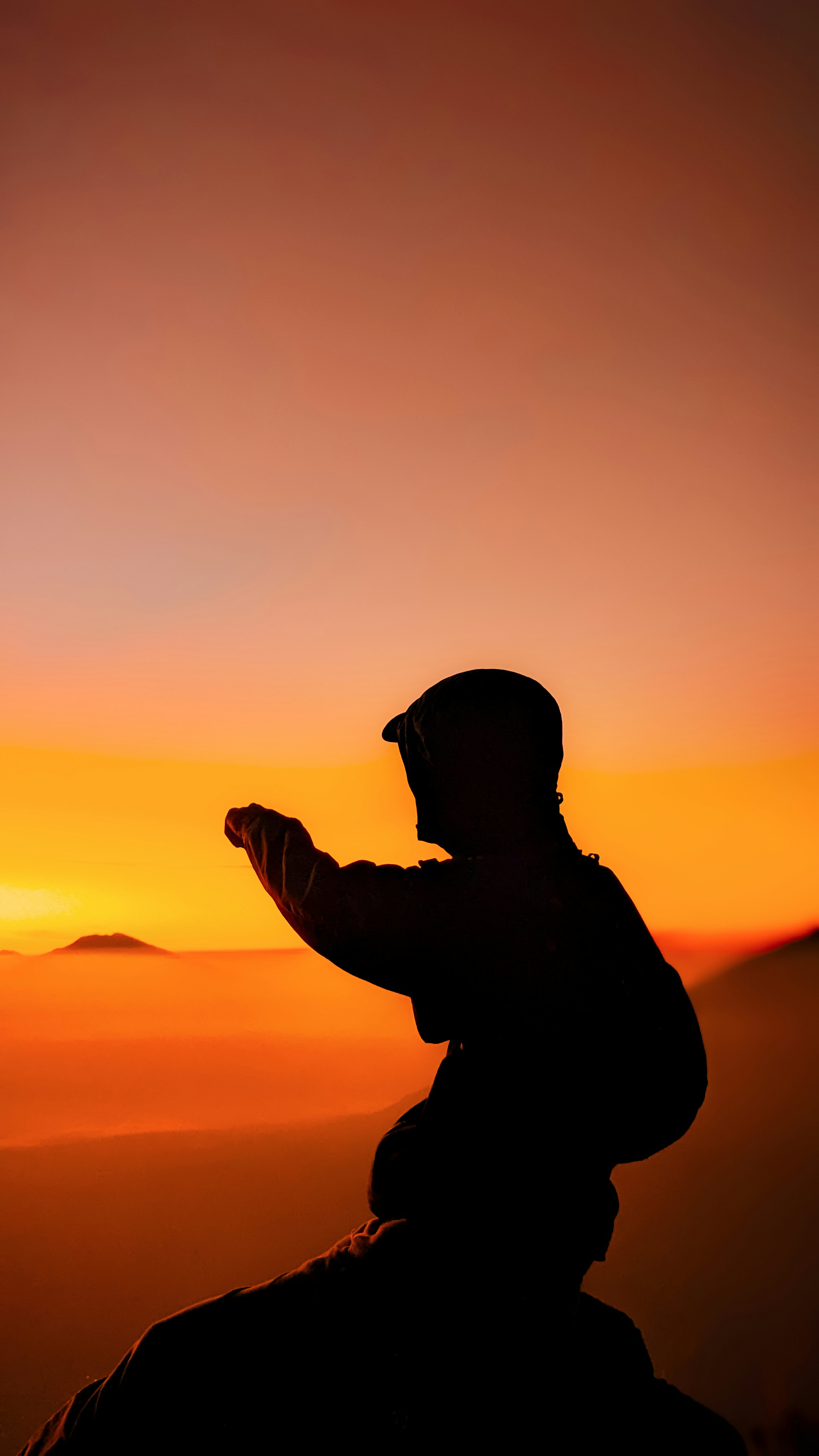 Molten Horizon Silhouette: A Figure on the Edge at Sunset