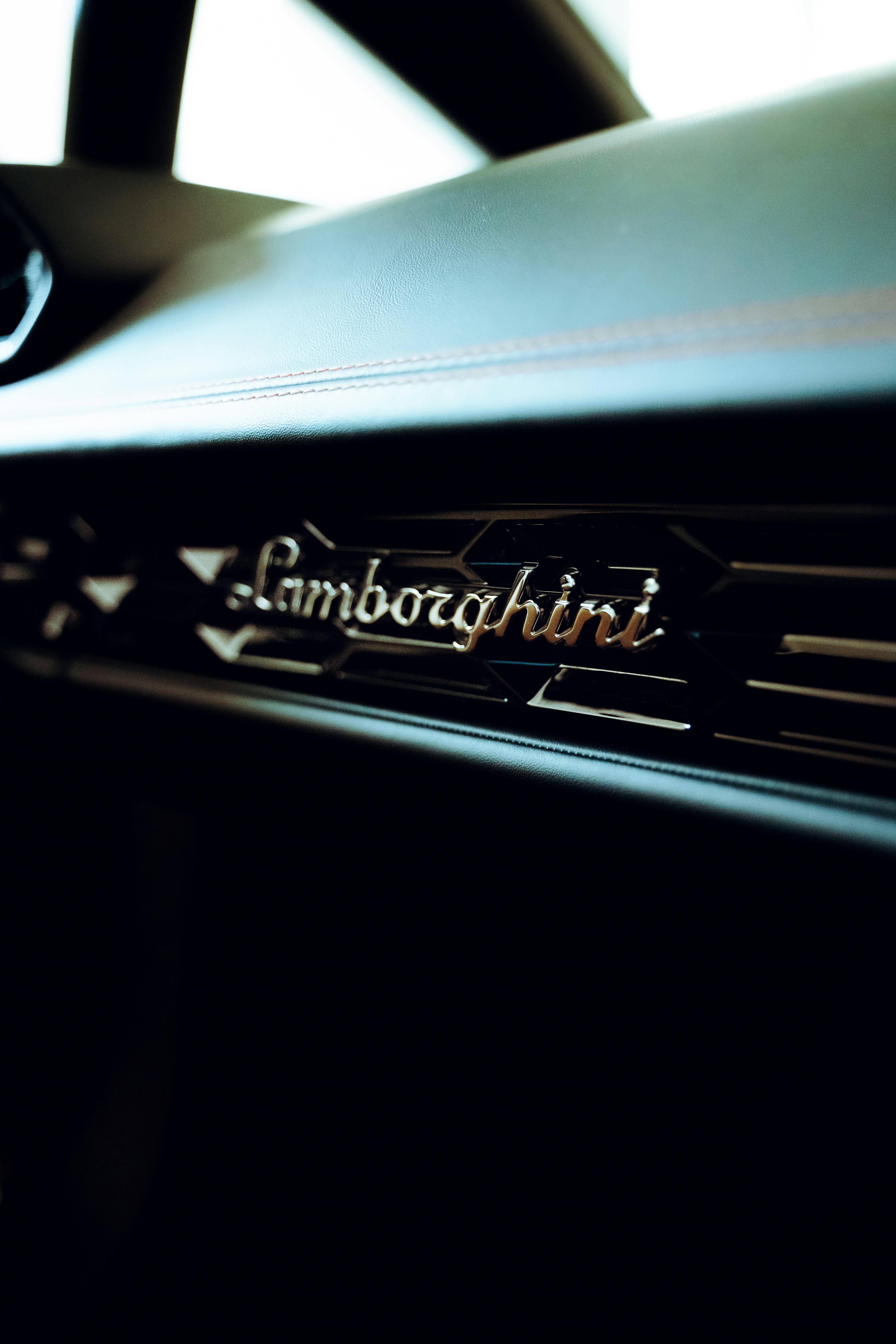 Chrome in the Quiet Haze: A Lamborghini Dash Portrait