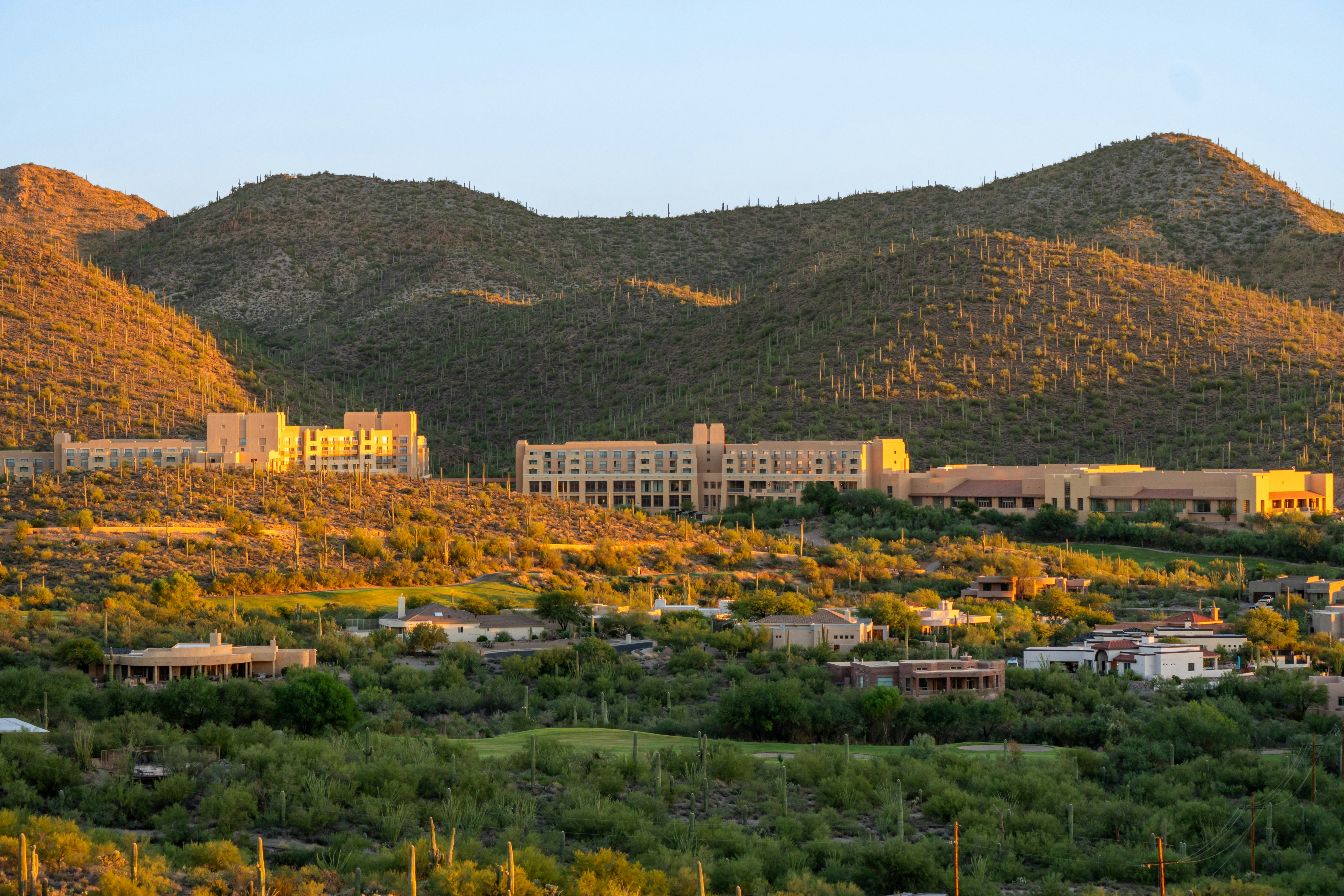 Beige Campus Nestled at the Foot of Golden Desert Hills