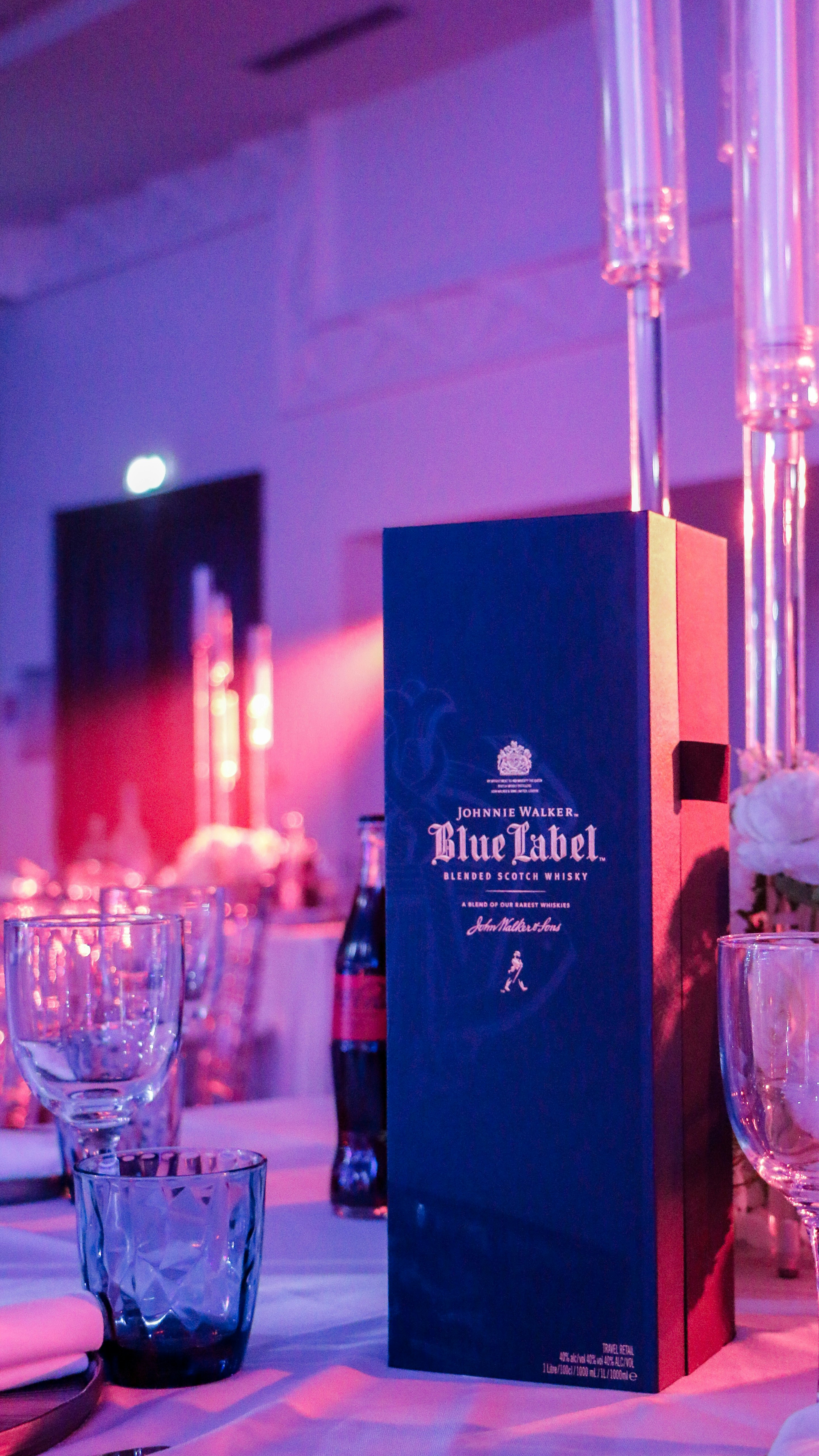 Blue Label Under Neon Velvet: A Whisky Centerpiece at a Gala