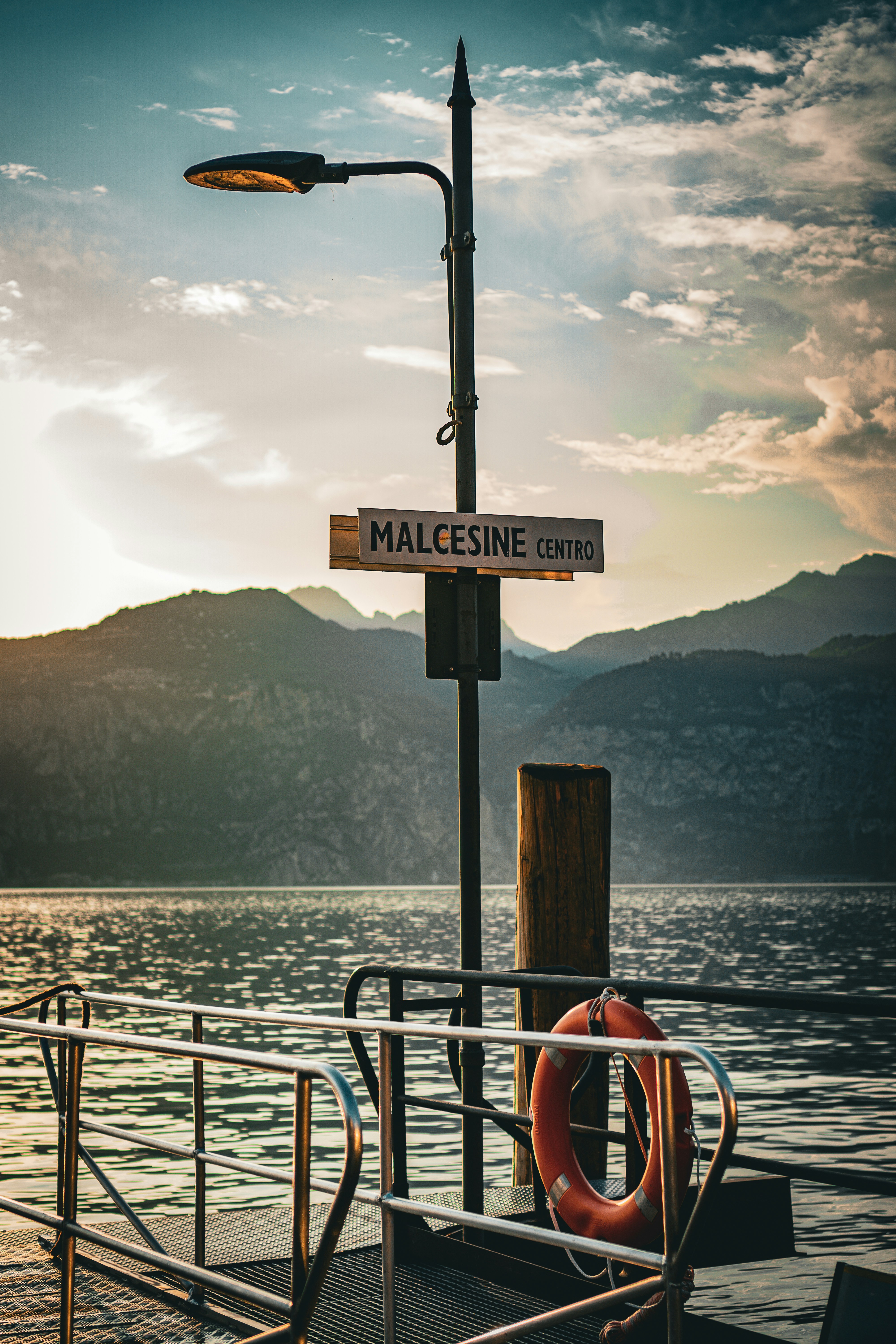Signpost by Malcesine Centro: Dusk on Lake Garda
