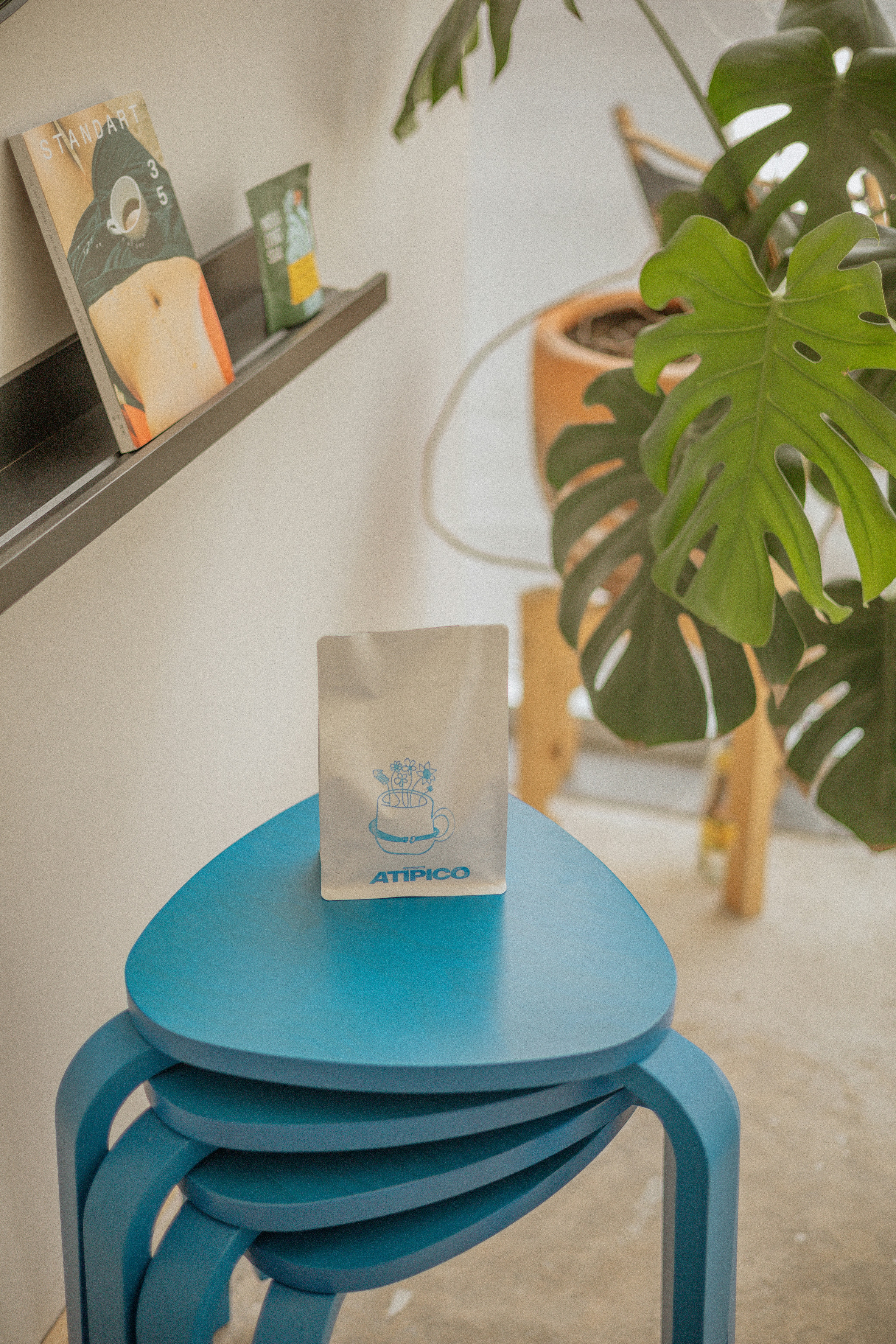 ATIPICO on a Layered Blue Stool: A Quiet Studio Coffee Moment