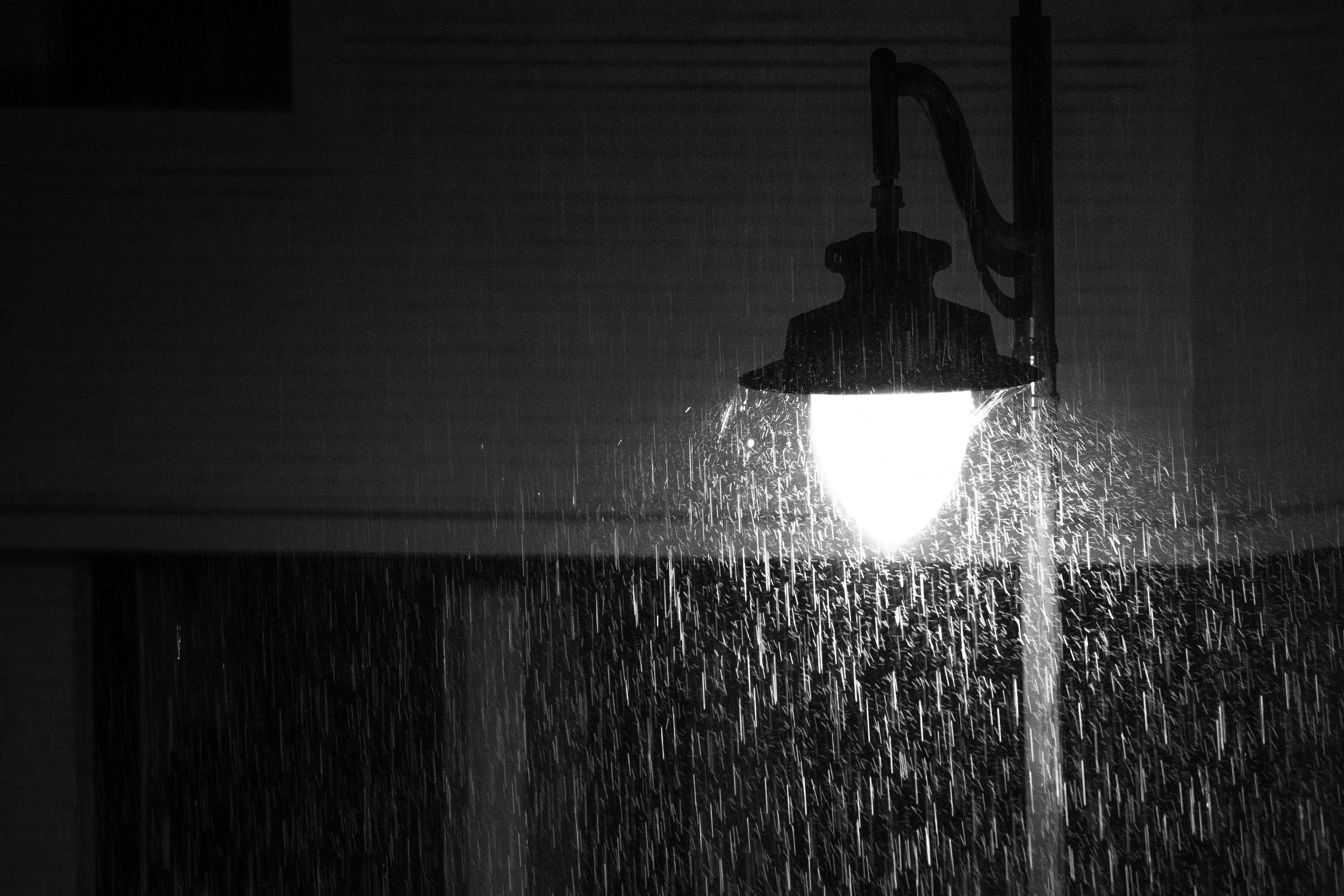 Midnight Lantern in a Monochrome Downpour
