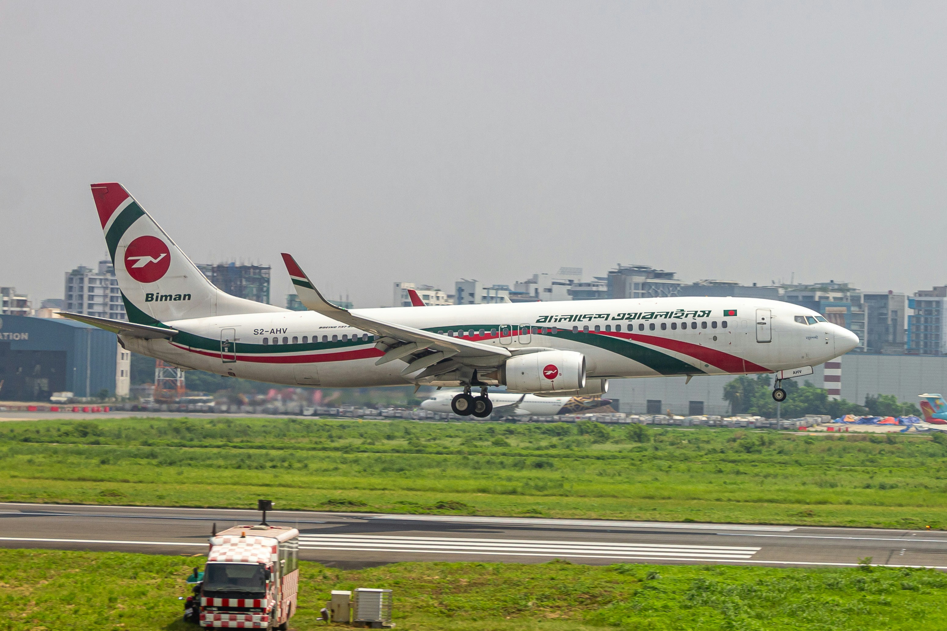 A large jetliner taking off from an airport runway photo – Free Hazrat ...