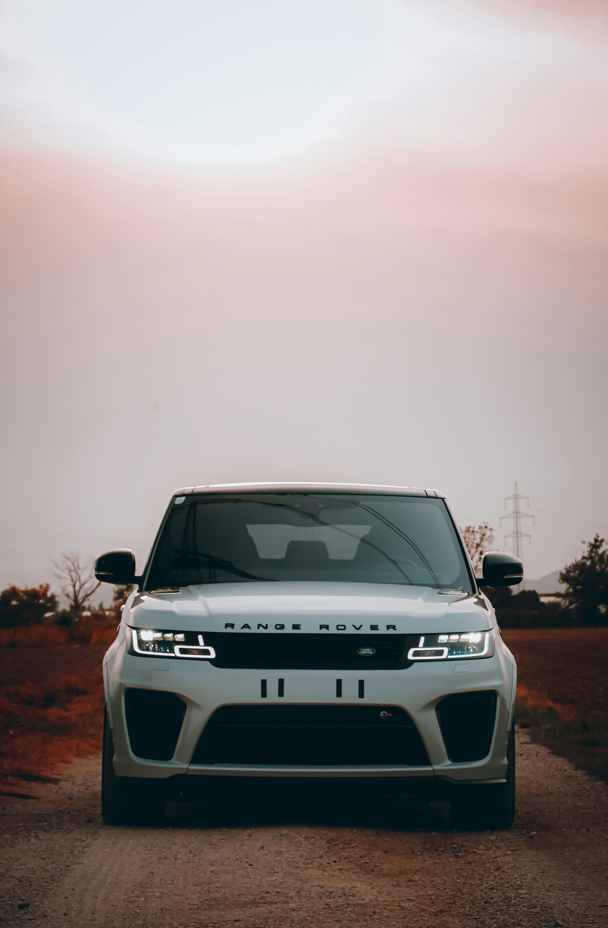 A silver range rover parked on a dirt road photo – Free Cars Image on ...