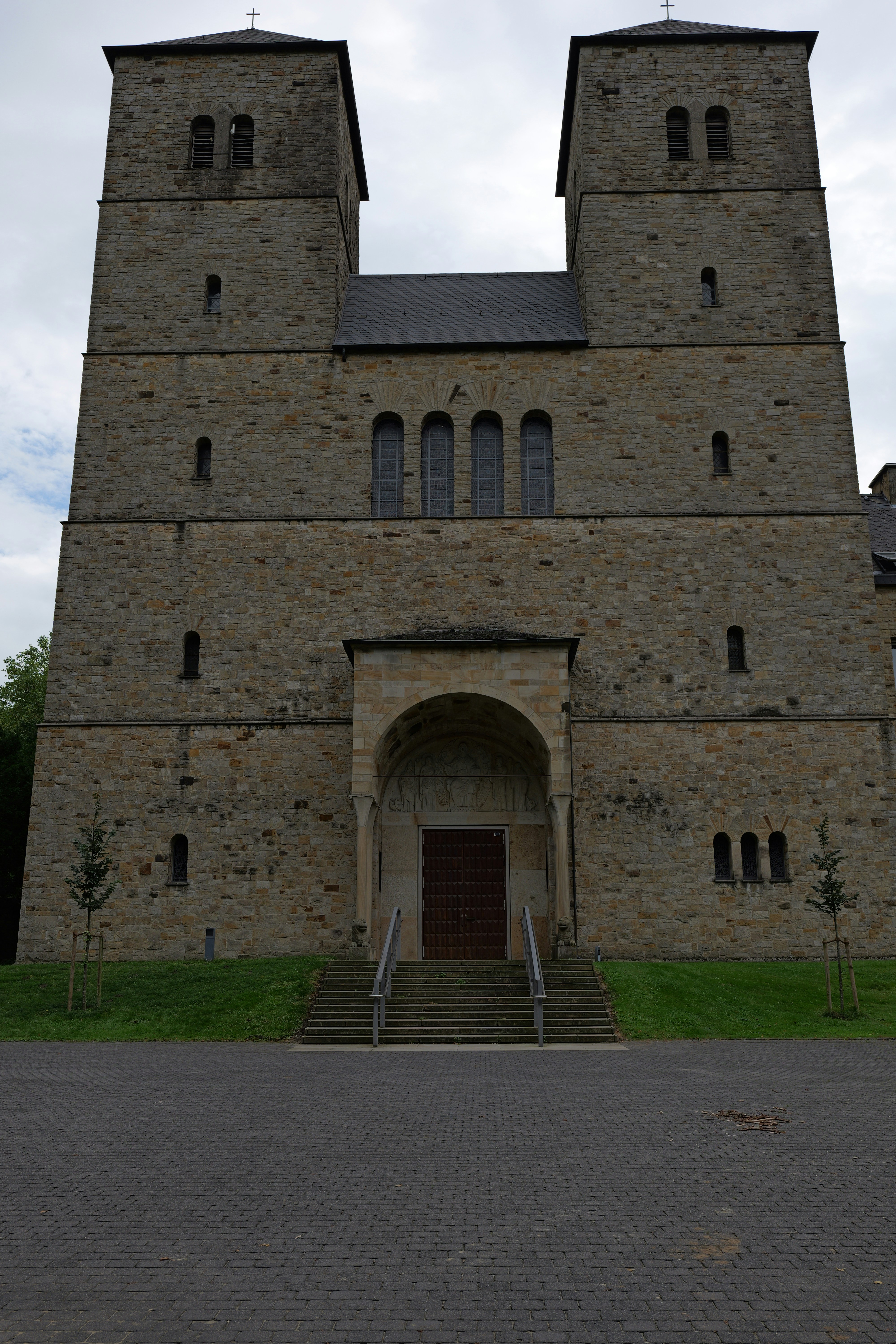 A large stone building with two towers on top of it photo – Free ...