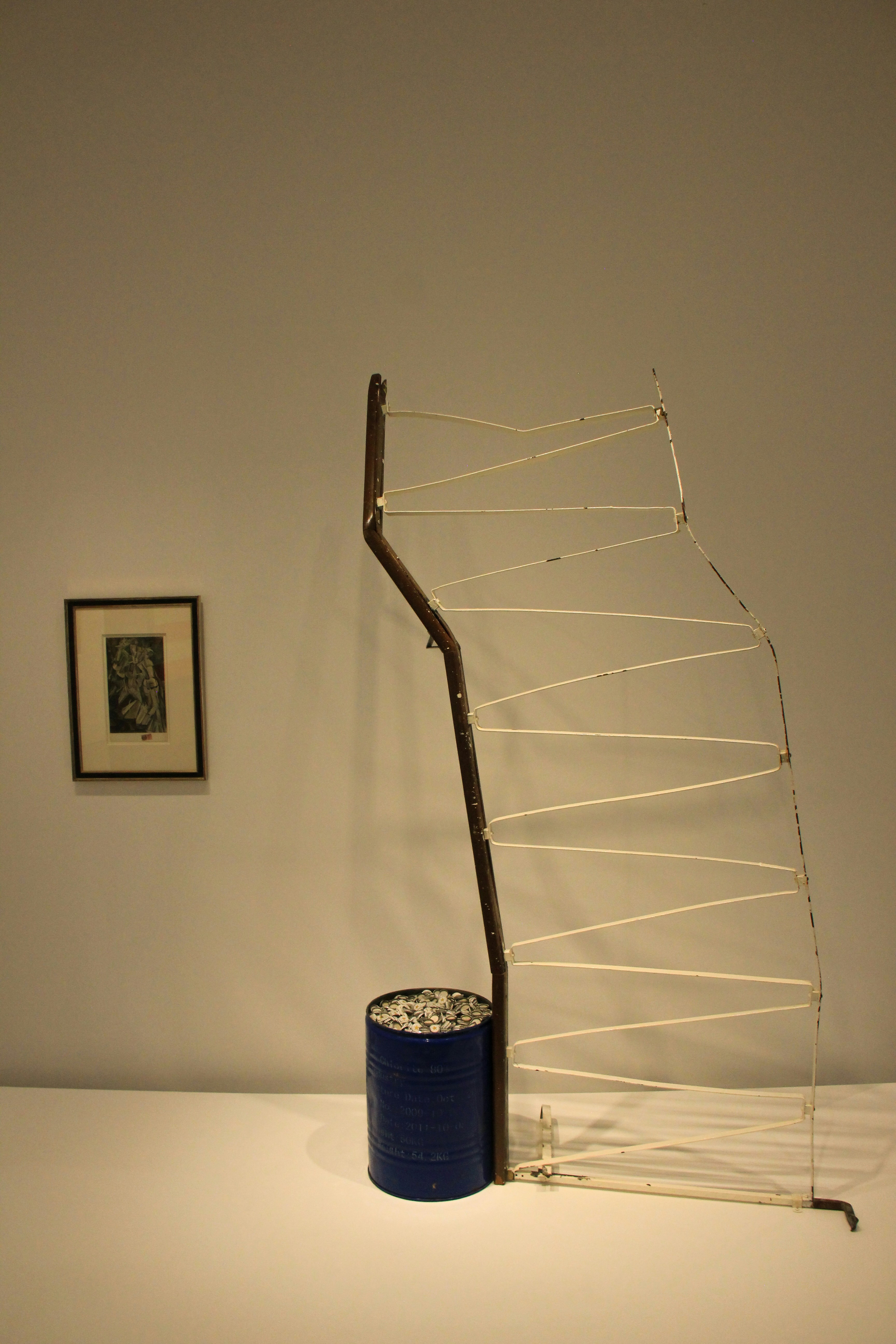 Spiral Scaffold: A Minimalist Helix in a Quiet Gallery