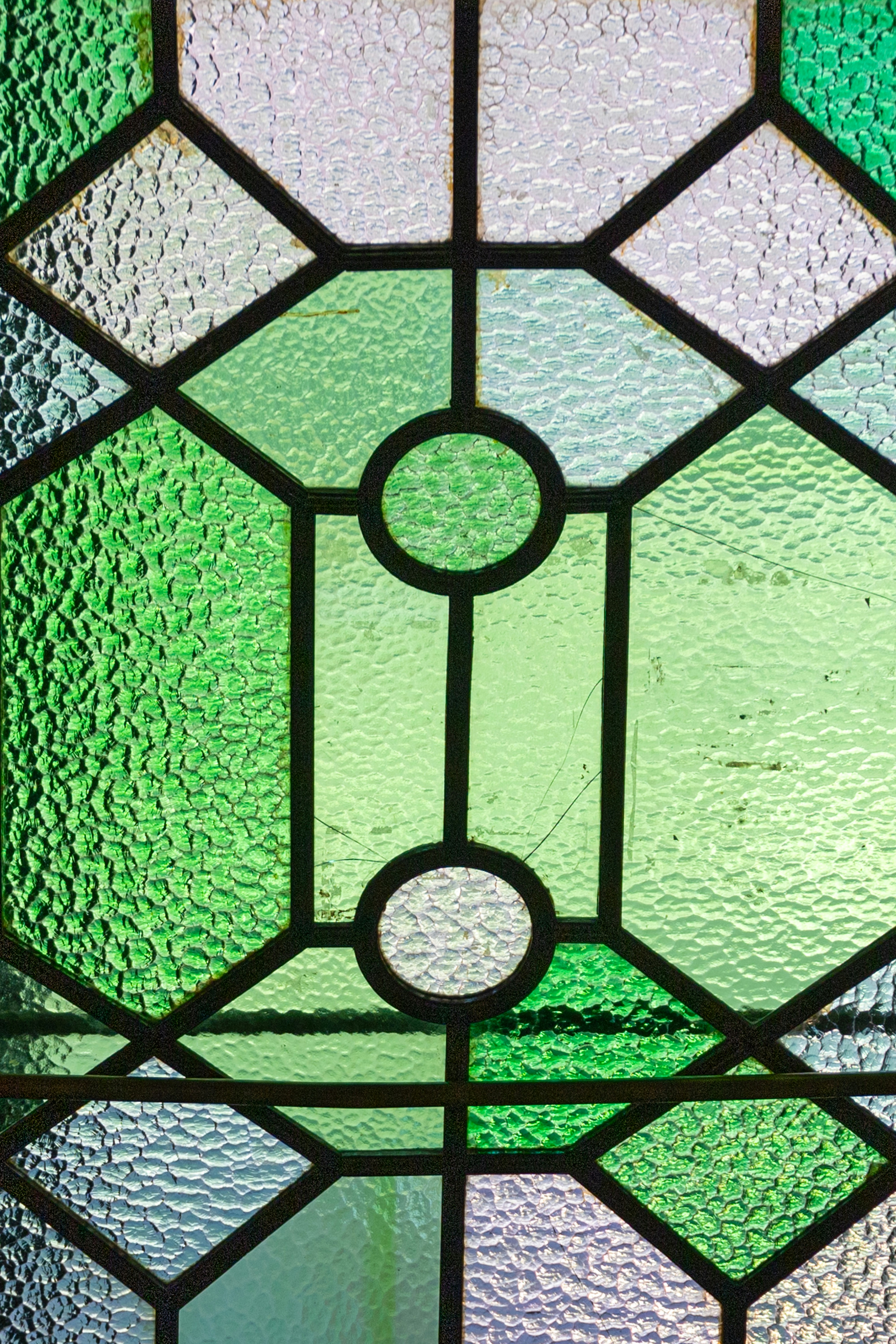 A close up of a stained glass window photo – Free Green Image on Unsplash