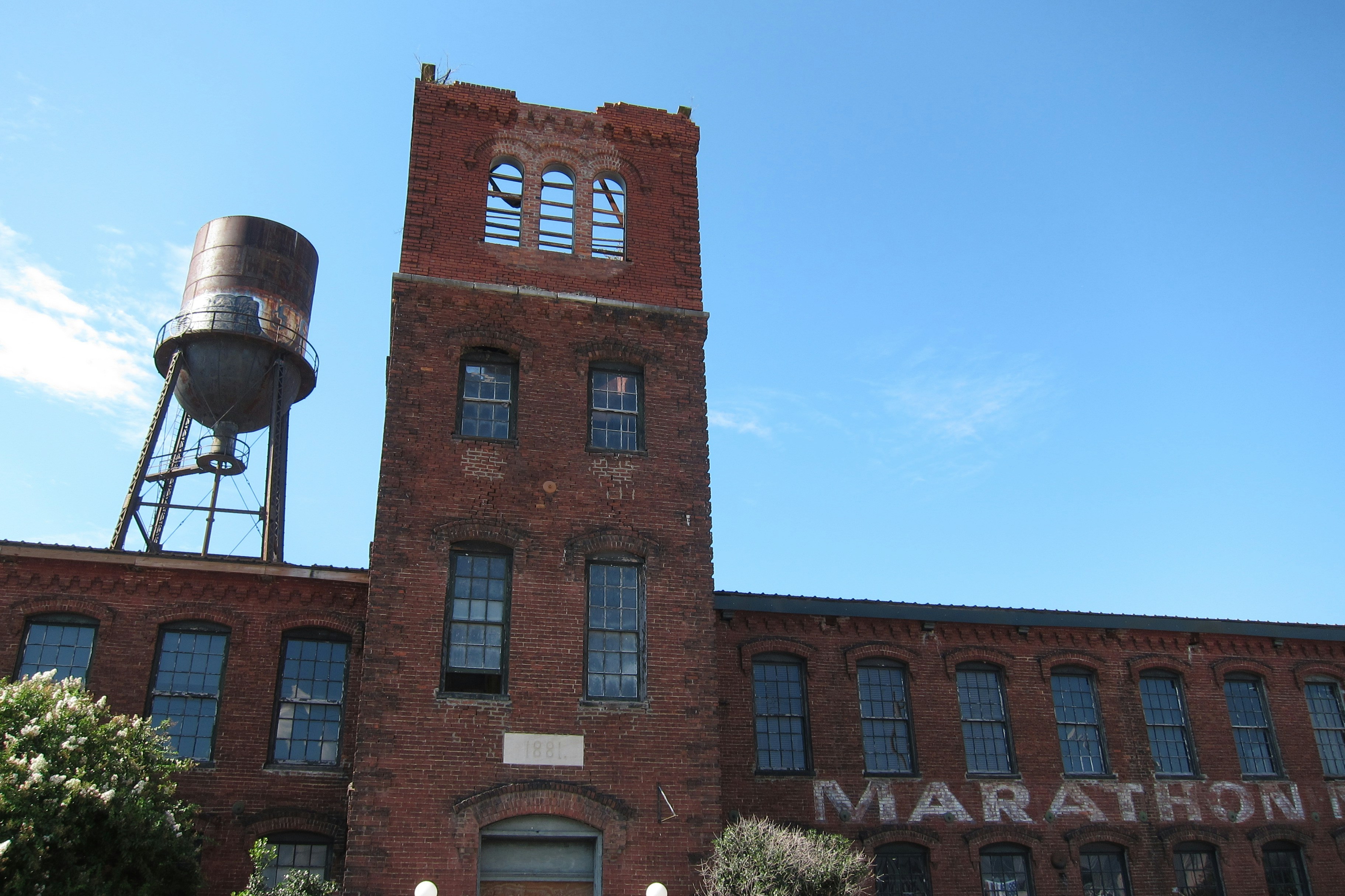 Marathan Motor Works building, Nashville, TN, USA | A large brick building with a water tower