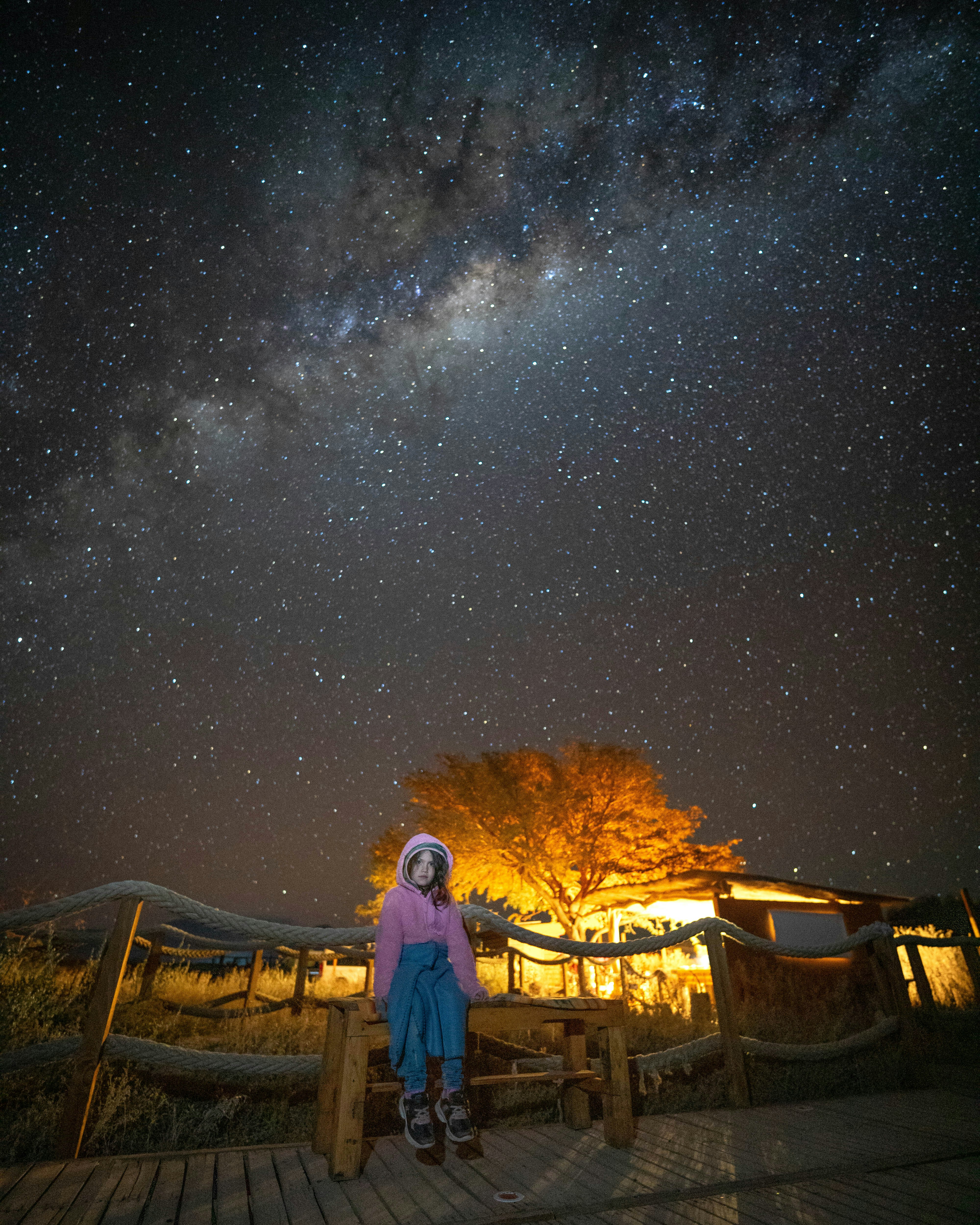 Milky Way Over a Golden-Glow Fence: A Night Portrait