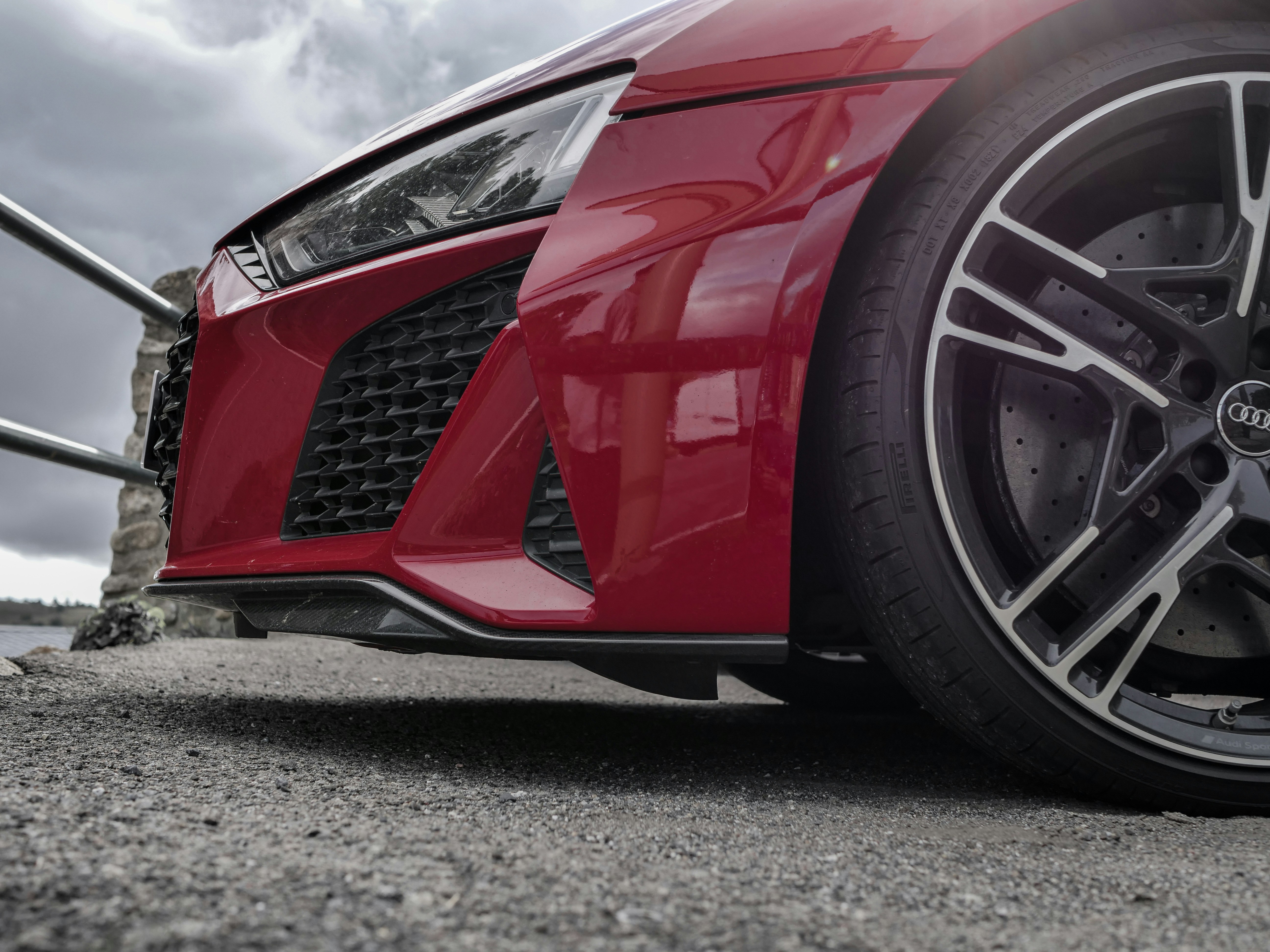A red car parked on the side of a road photo – Free Audi r8 Image on ...