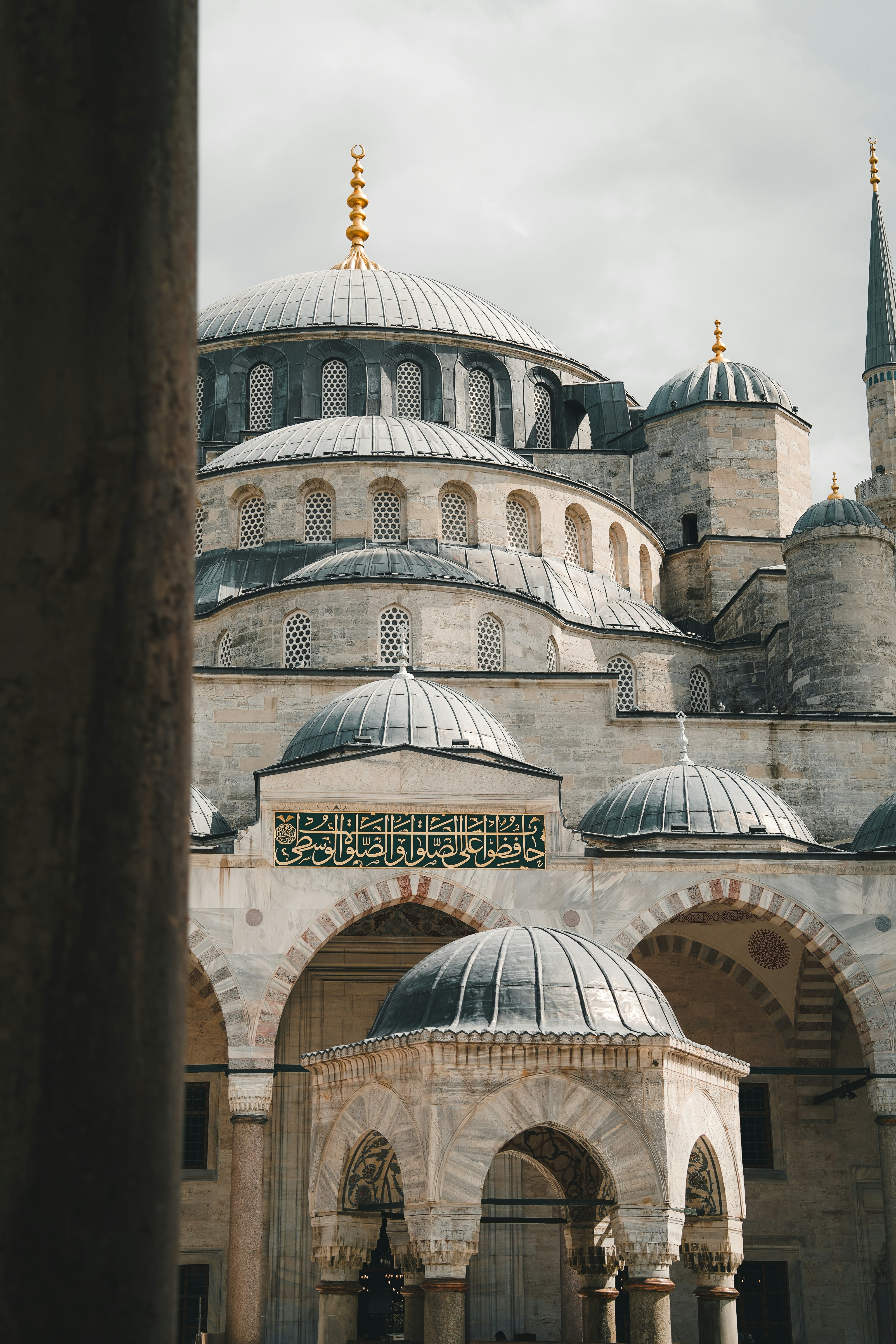 A large building with many domes on top of it photo – Free Binbirdirek ...