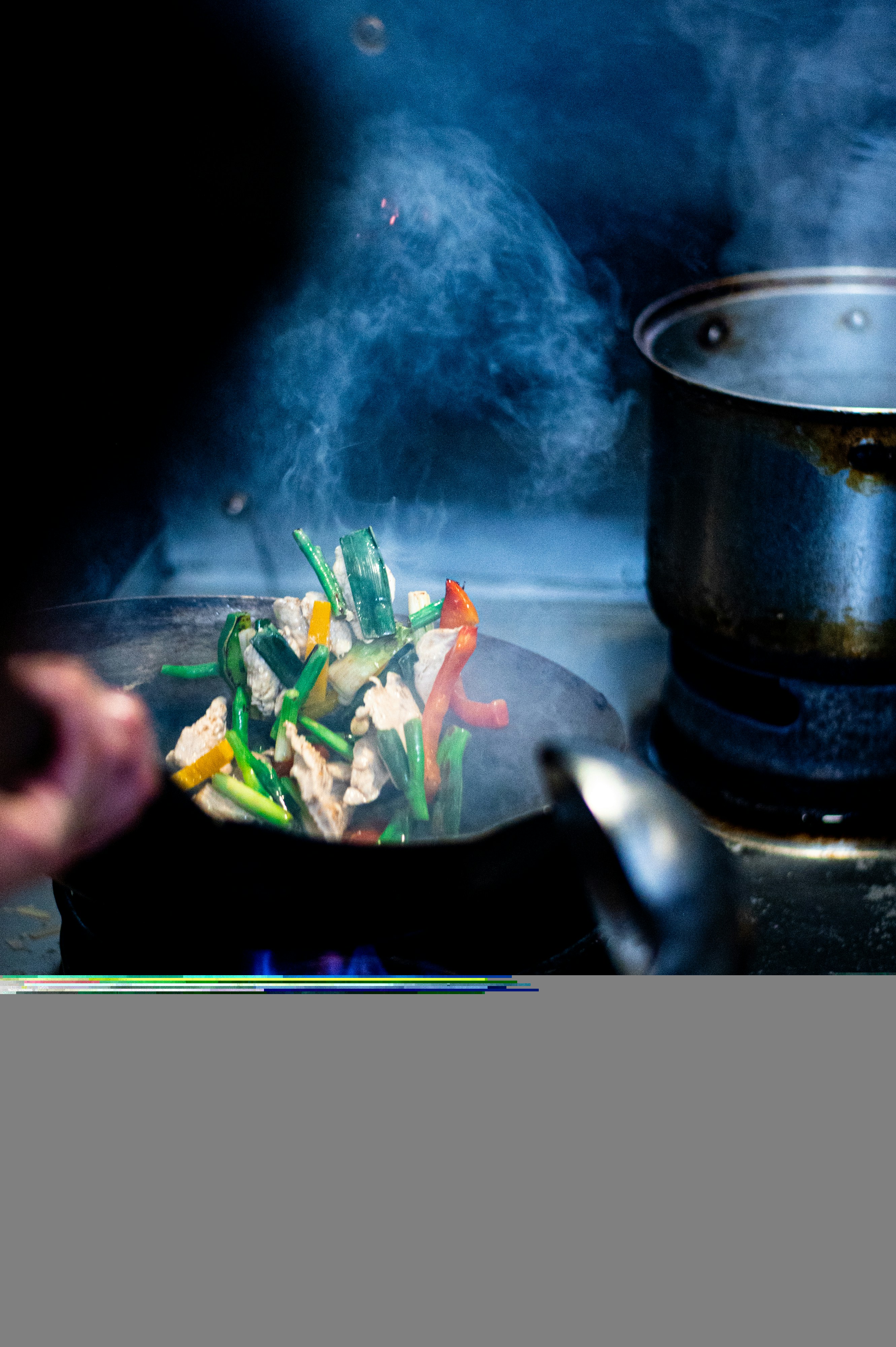 A person cooking food in a pot on a stove photo – Free Cooking pan ...