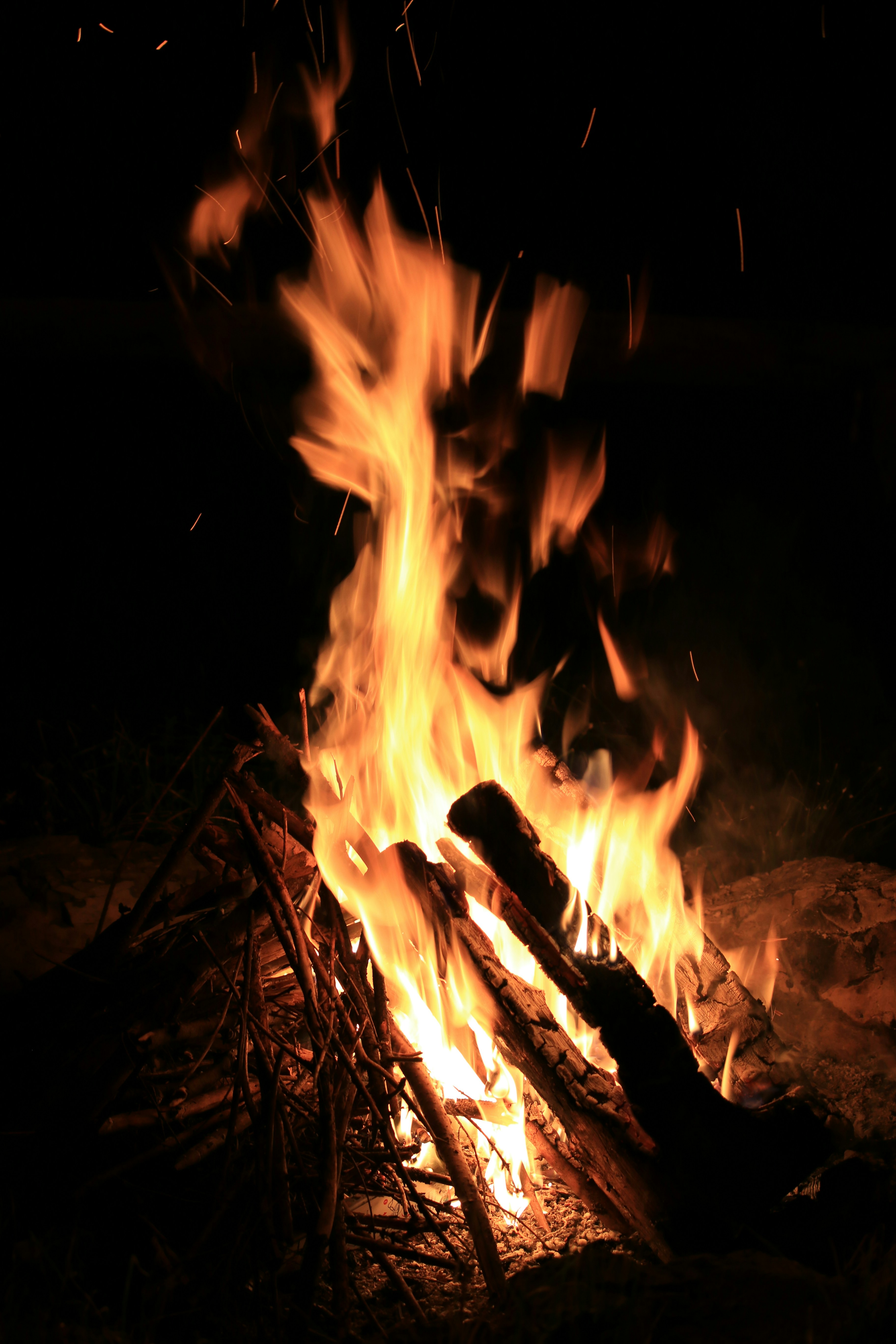 A fire burning in the dark with lots of flamesOlga Deeva