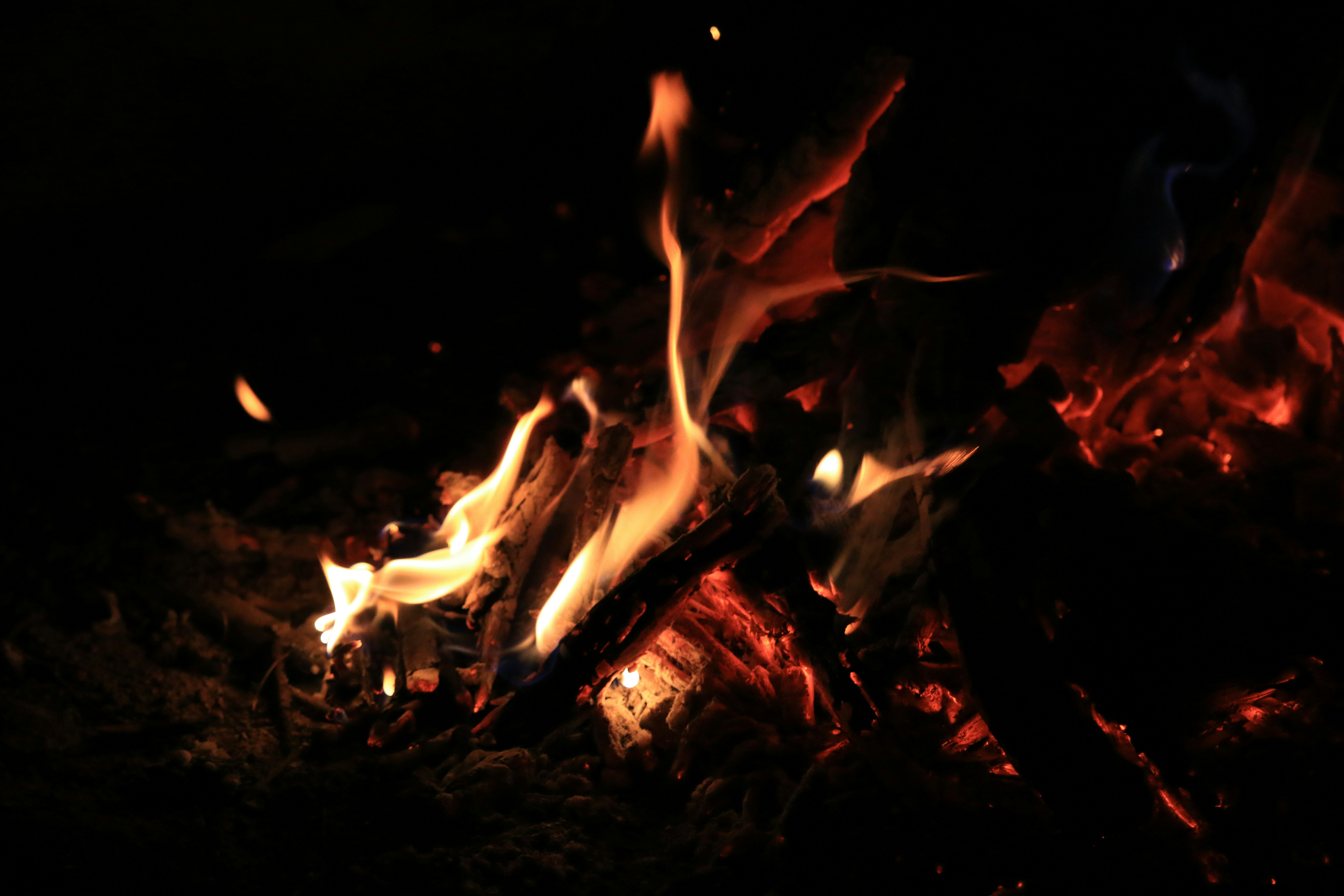 A close up of a fire in the dark photo – Free Outdoor Image on Unsplash