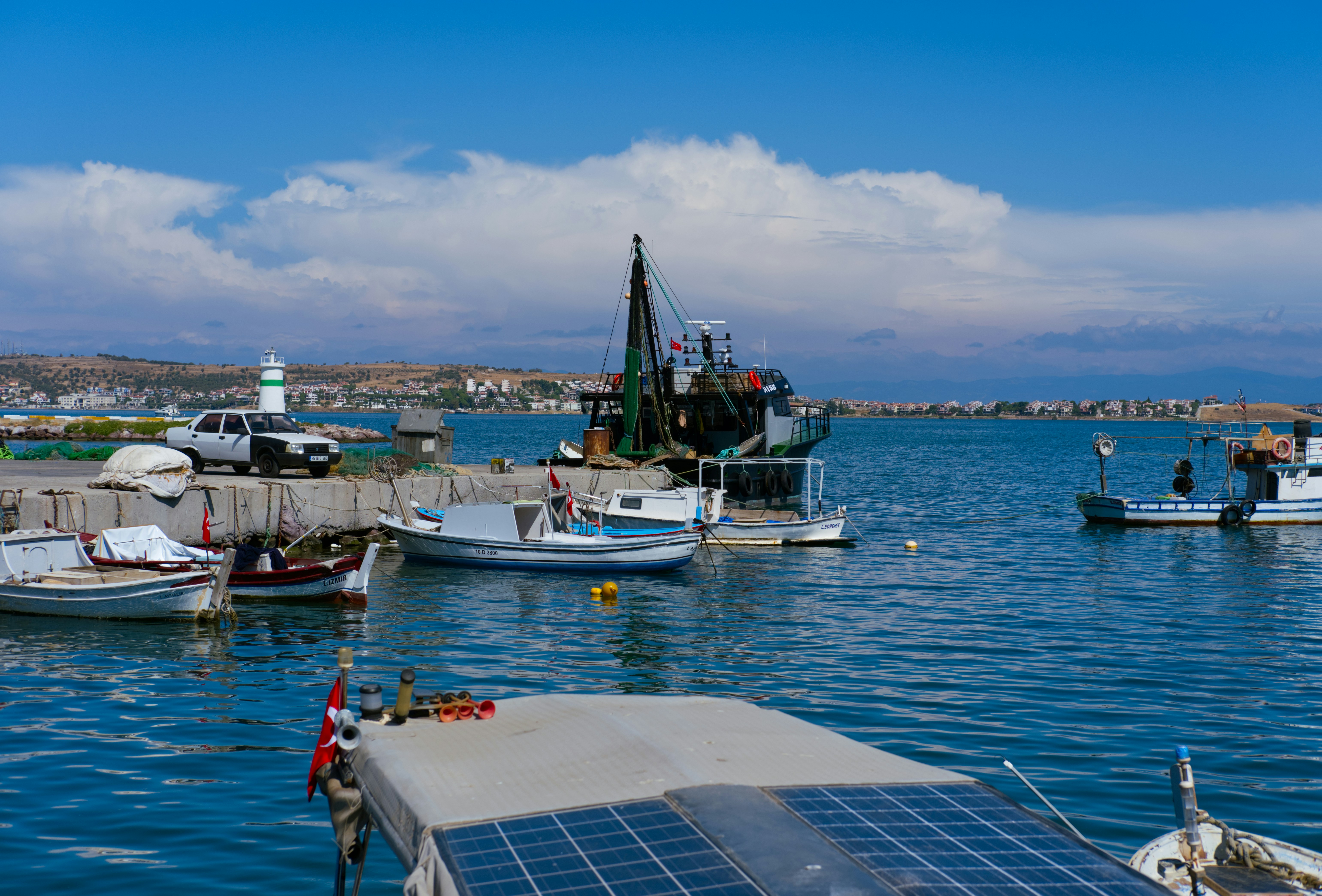 Crane Vessel Framing a Calm Harbor