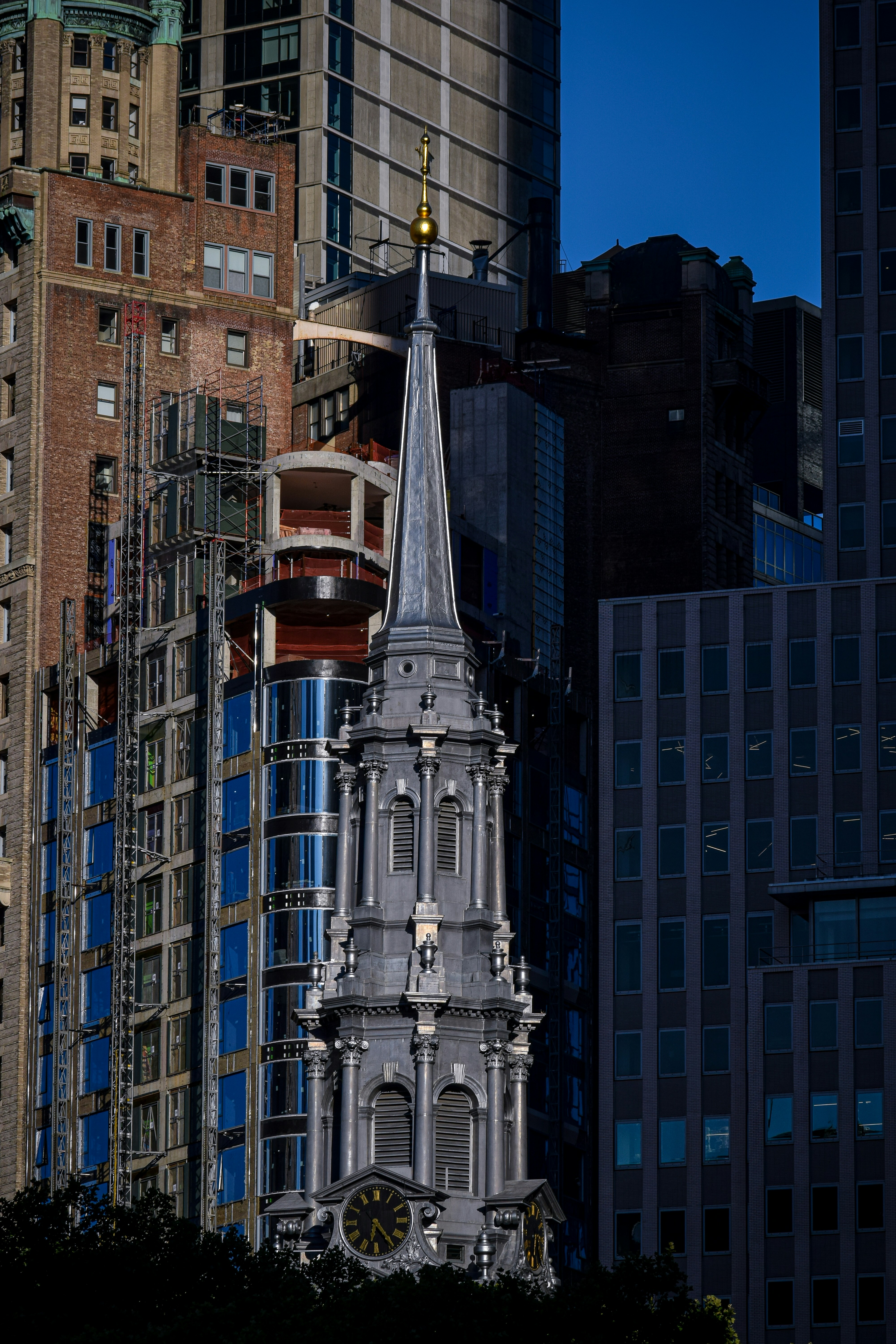 The Silver Spire Between Giants