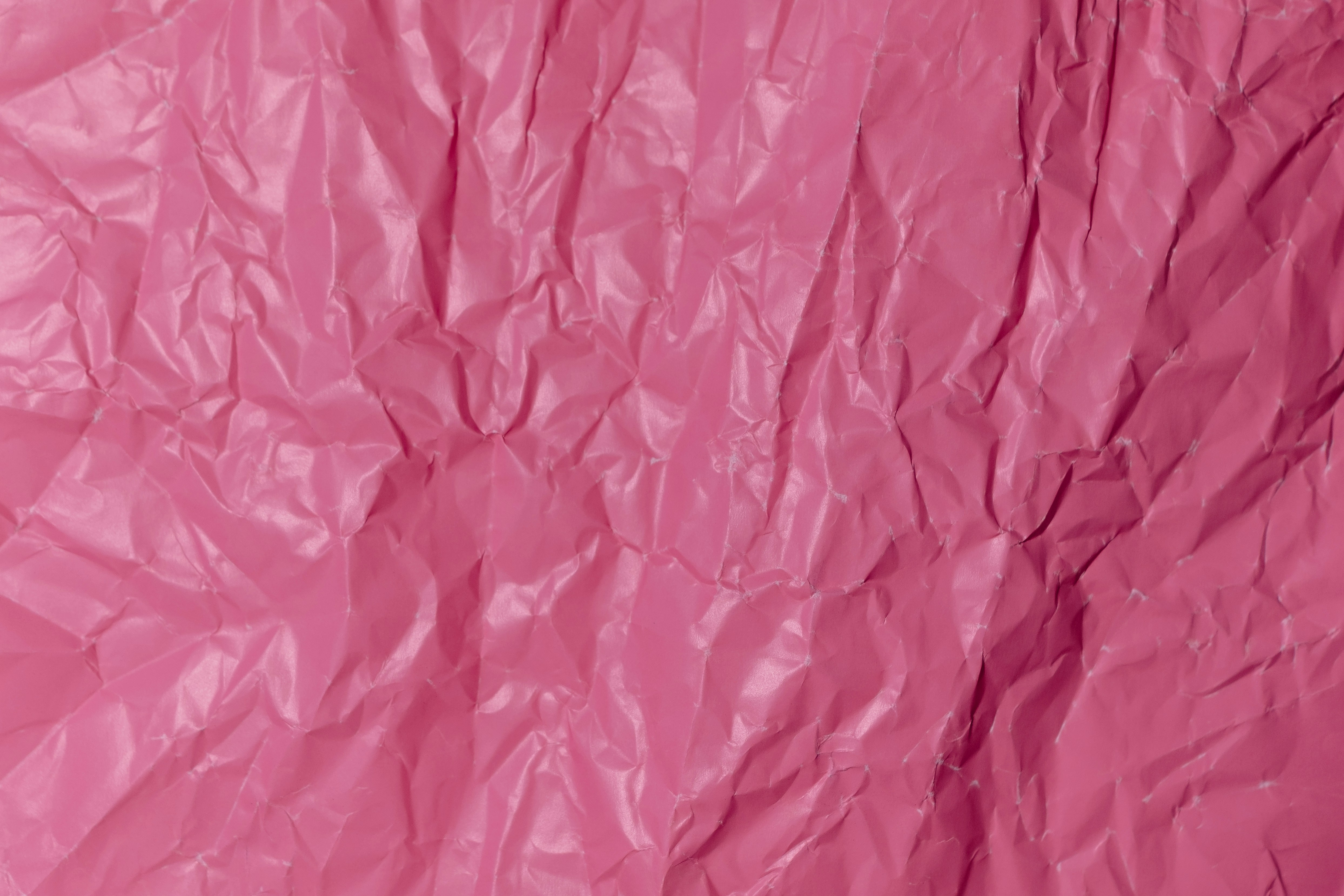 Petal-Pink Corrugations: Light Weaving Through Crumpled Paper